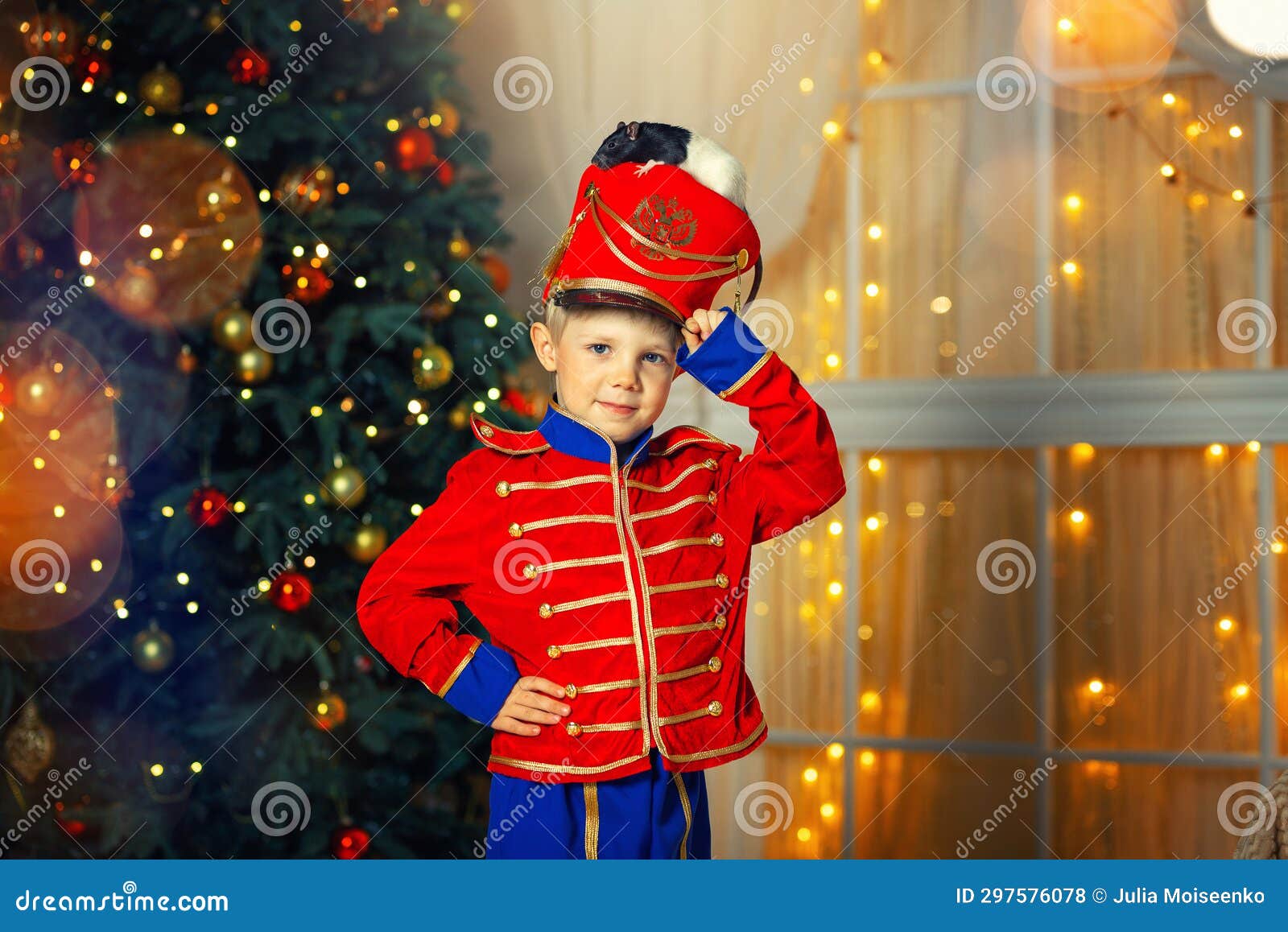 A Boy in a Nutcracker Costume Plays with the Mouse Symbol of the Year. Stock Photo - Image of ...