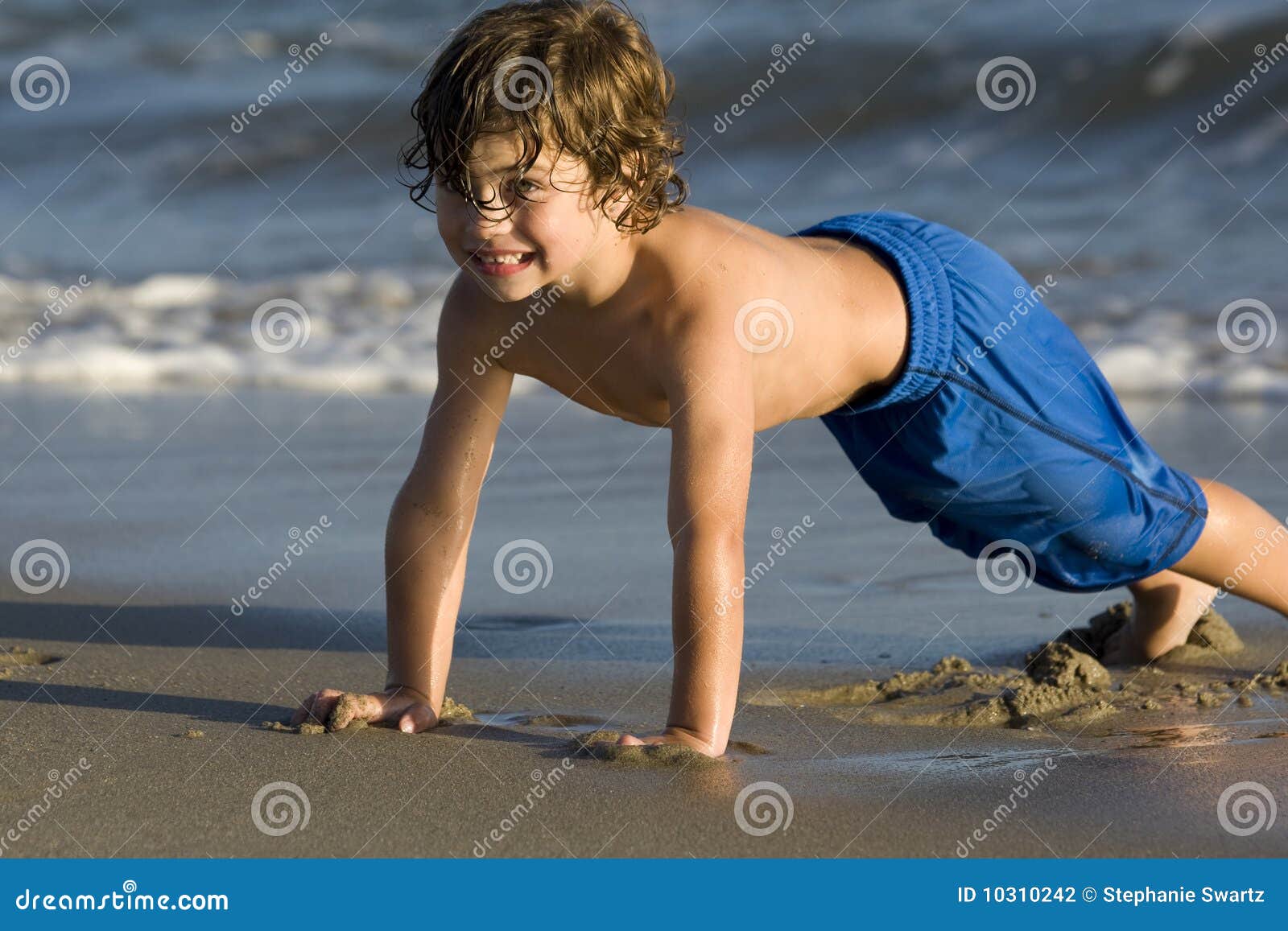 Boy in the ocean stock photo. Image of portrait, light - 10310242