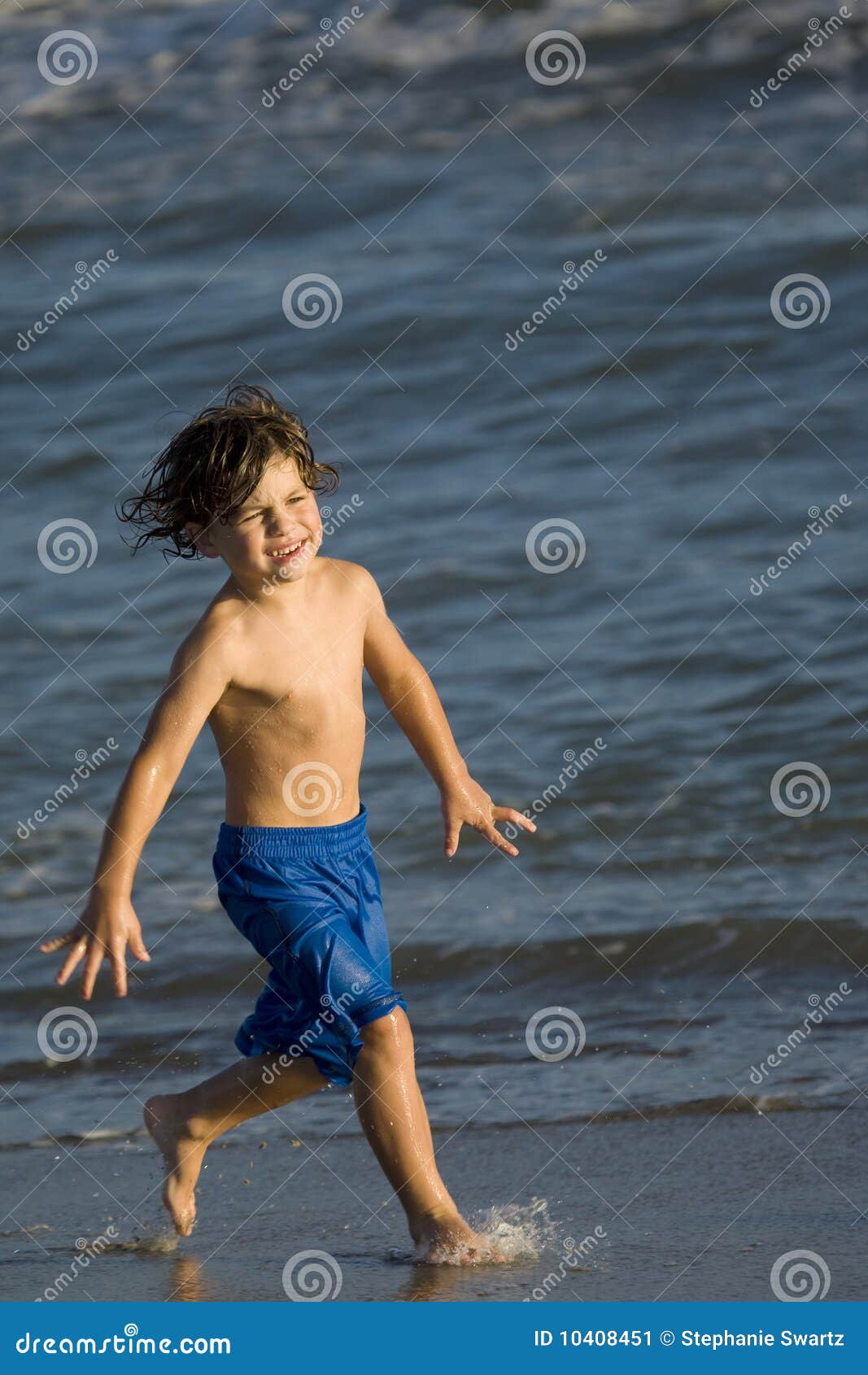 Boy in the ocean stock image. Image of blue, portrait - 10408451