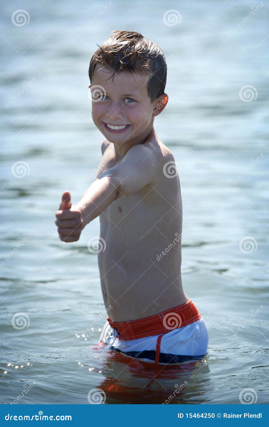 Boy in ocean stock photo. Image of blue, caucasian, beach - 15464250