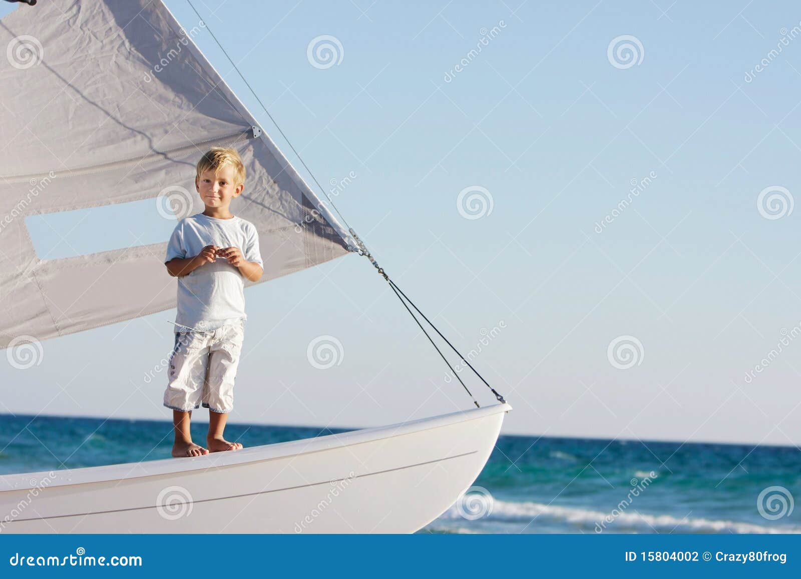 Boy onboard sea yacht stock photo. Image of romantic - 15804002