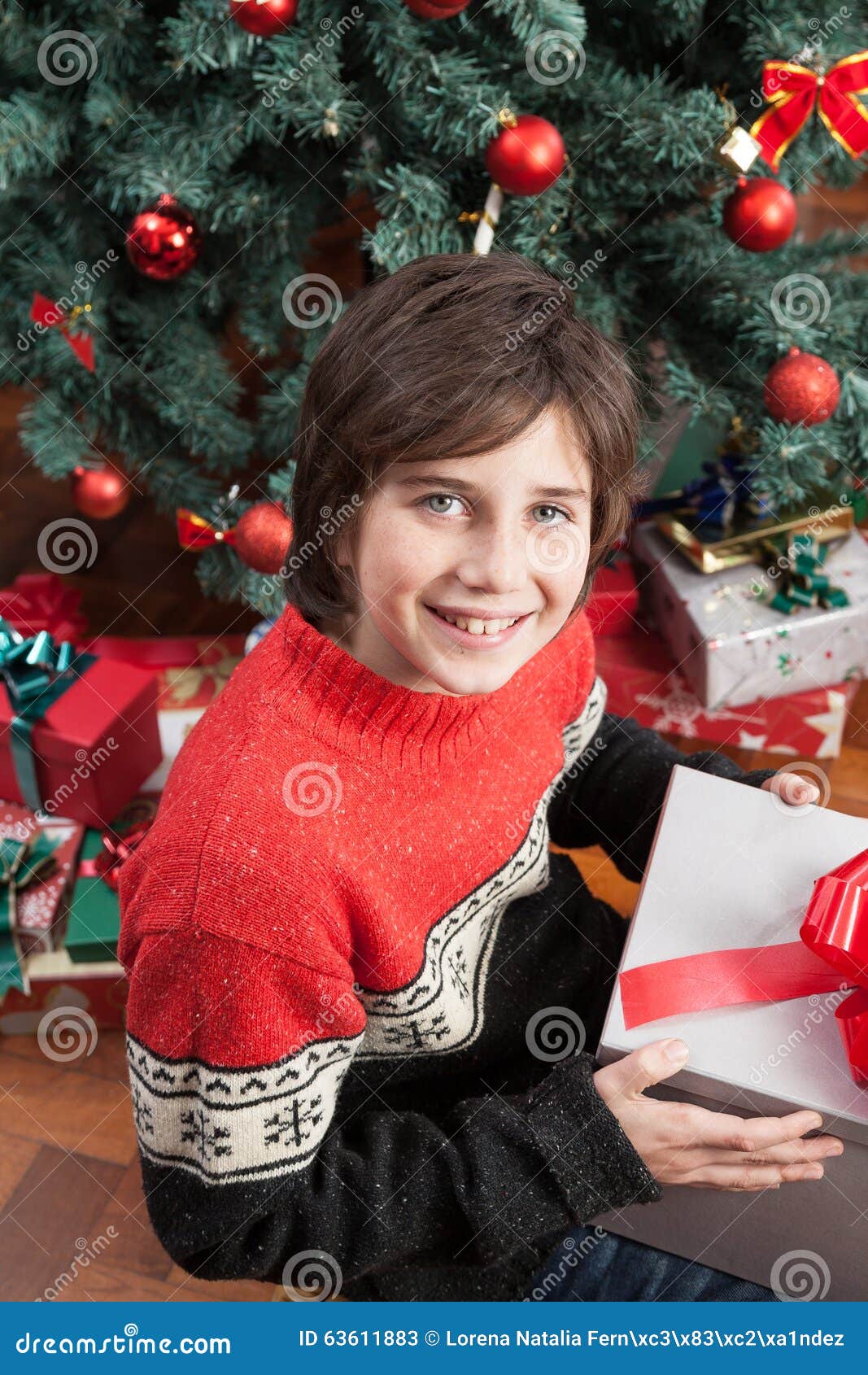 Boy Opening a Christmas Box Sitting in the Floor Stock Image - Image of ...