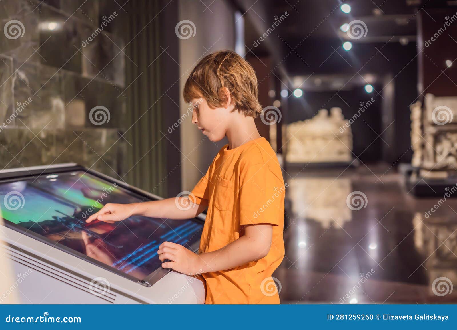 Boy Operating a Large Touch Screen Indoors Stock Photo - Image of blank ...