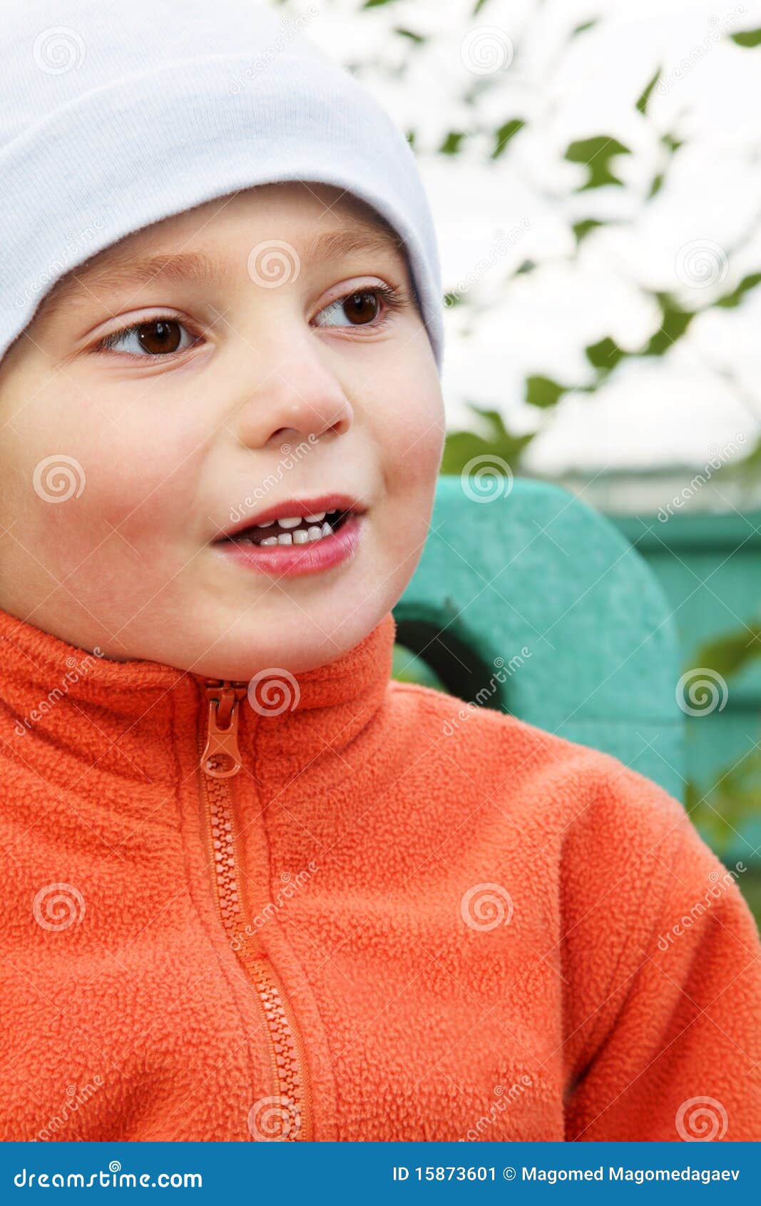 Boy in orange closeup stock image. Image of orange, male - 15873601