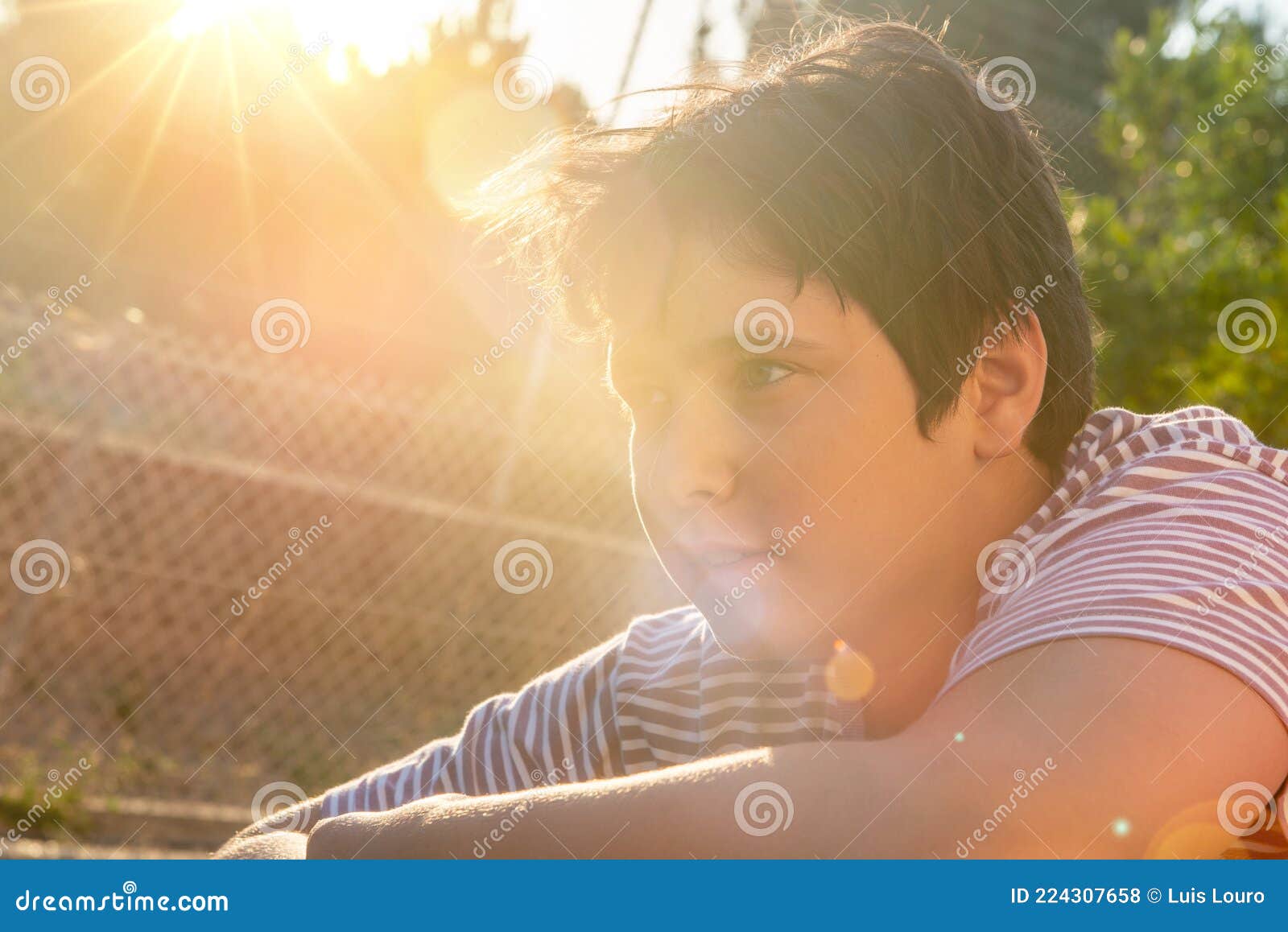 Boy outdoors at sunset stock photo. Image of white, countryside - 224307658