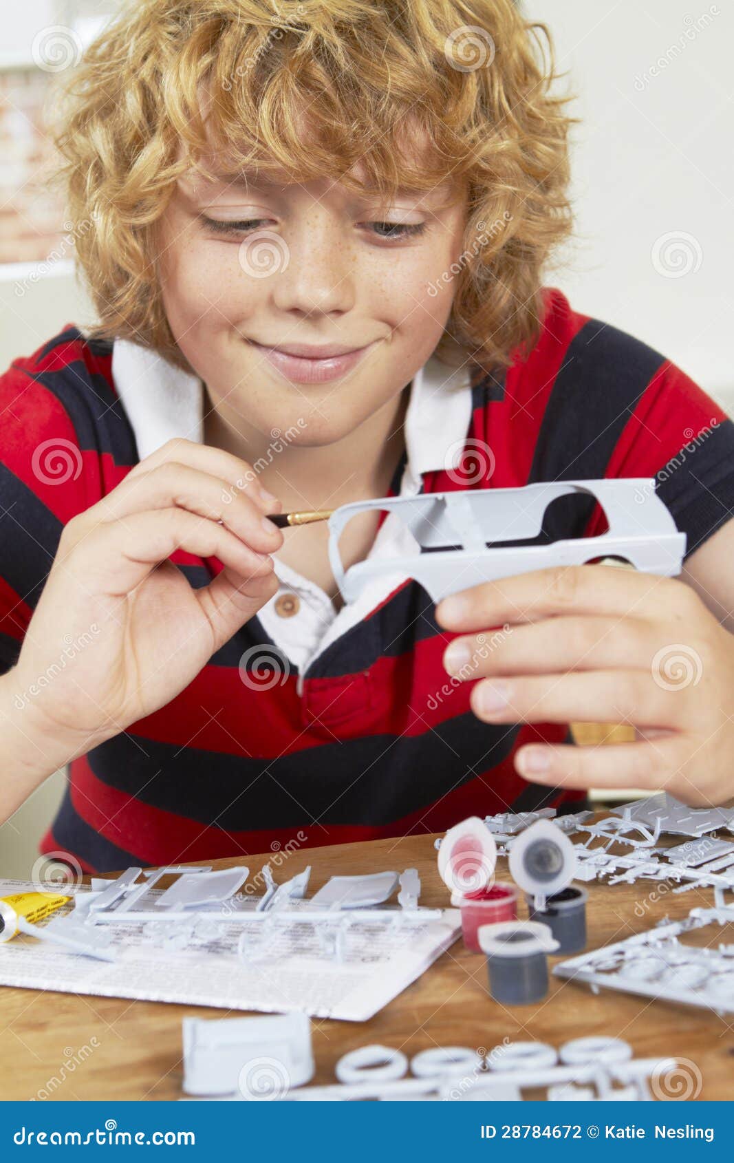 Boy Painting Model Car at Home Stock Photo - Image of children, model ...