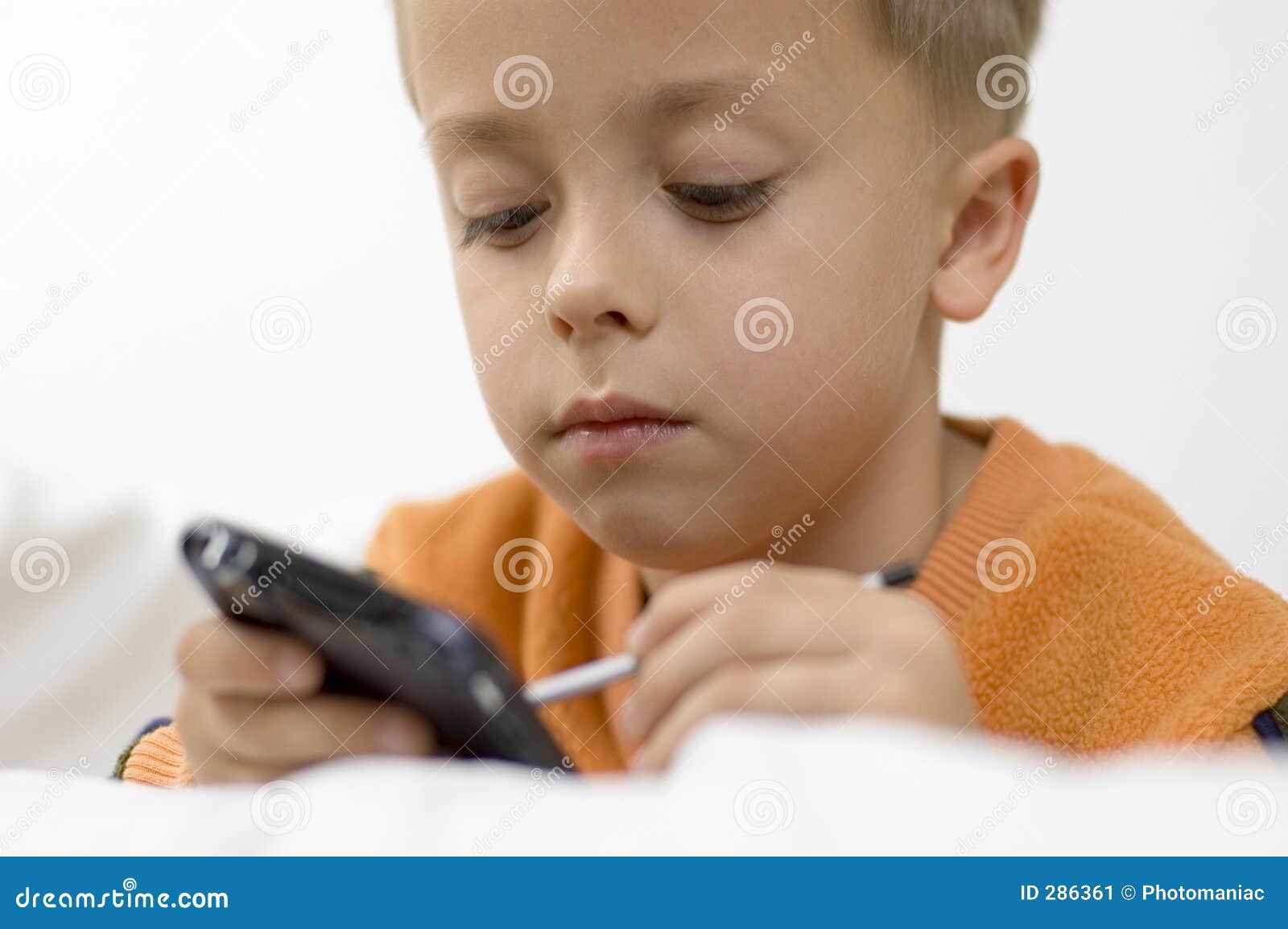 Boy / palmtop / white stock image. Image of optical, active - 286361