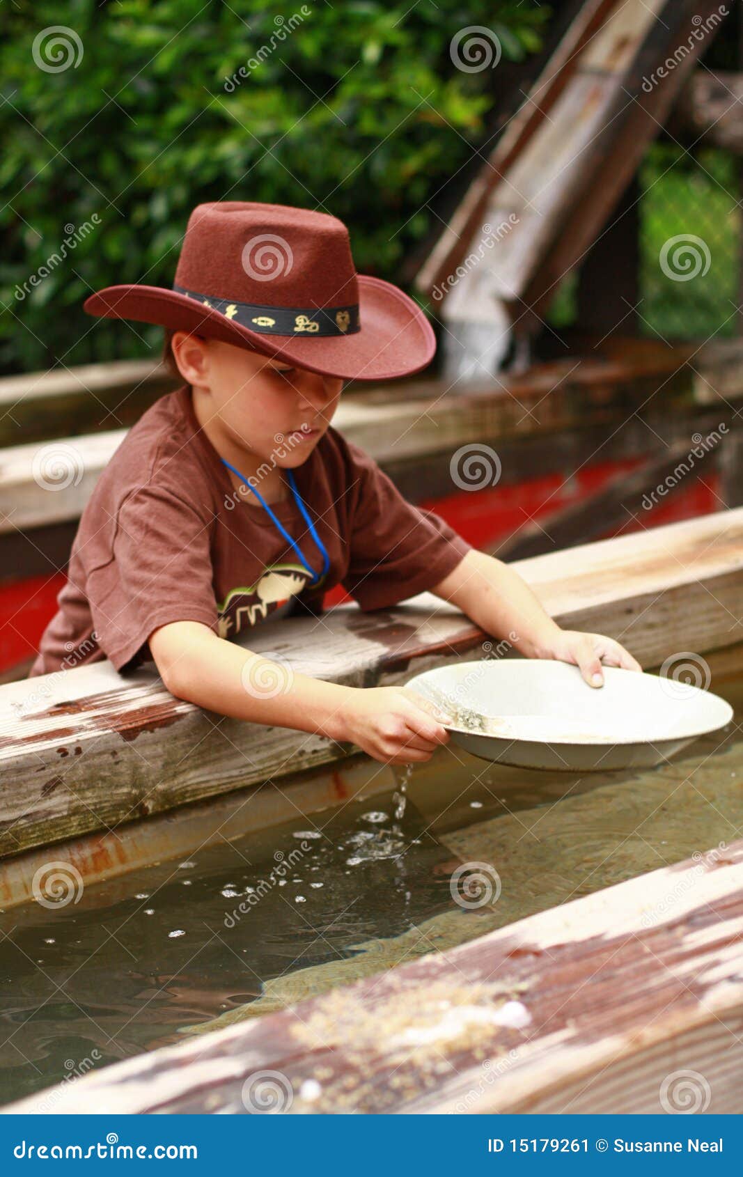 Boy panning for gold stock image. Image of precious, caucasian - 15179261