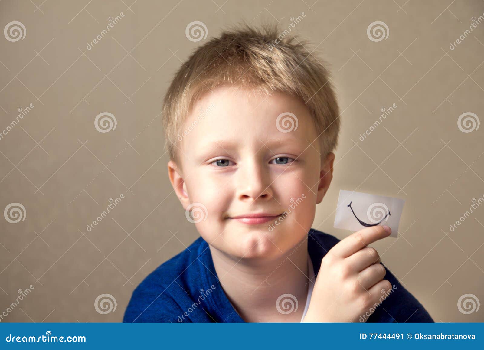 Boy with paper smile stock image. Image of emotion, personality - 77444491