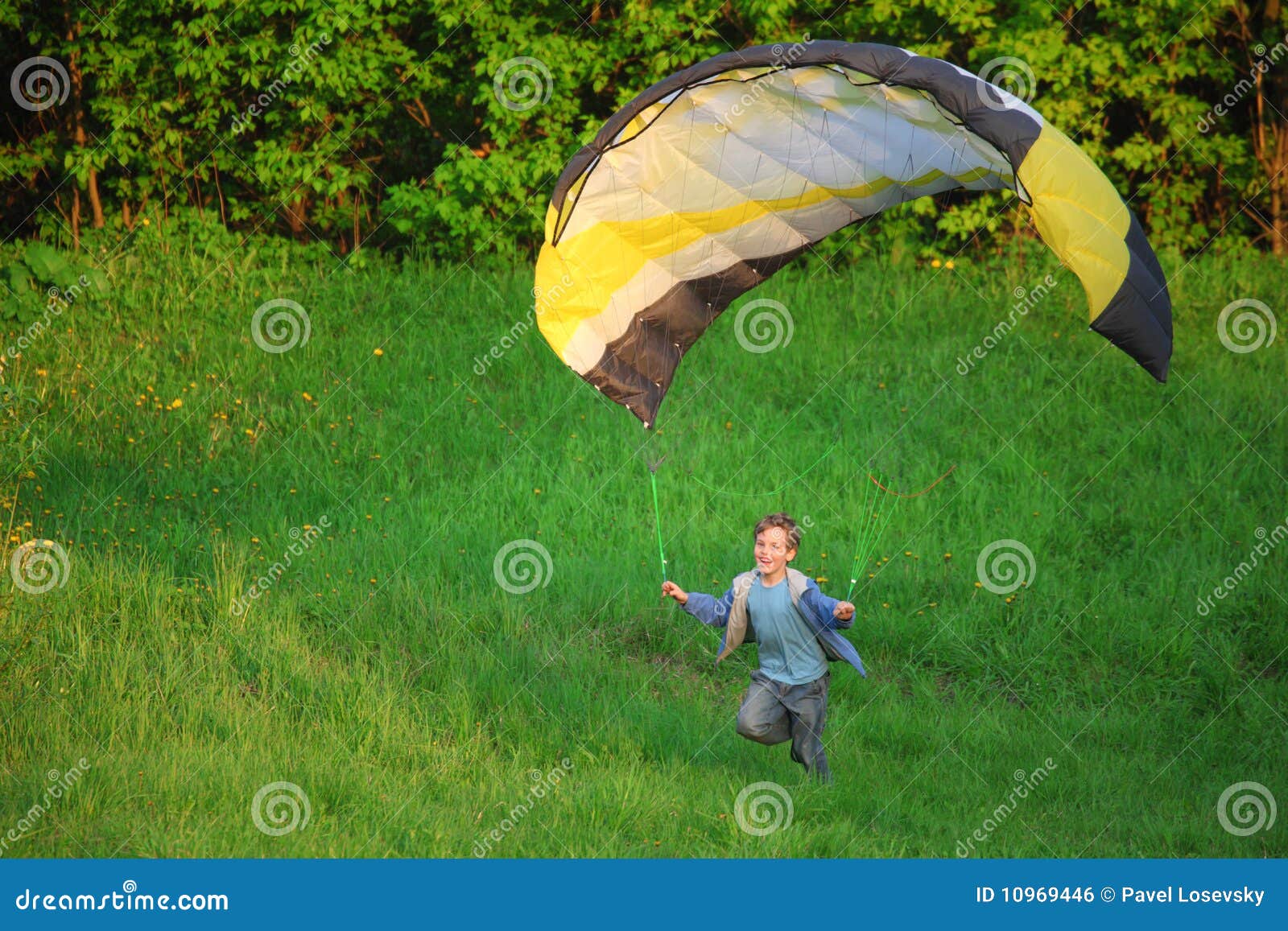 Boy and Parachute Near the Ground Stock Photo - Image of green, cute ...