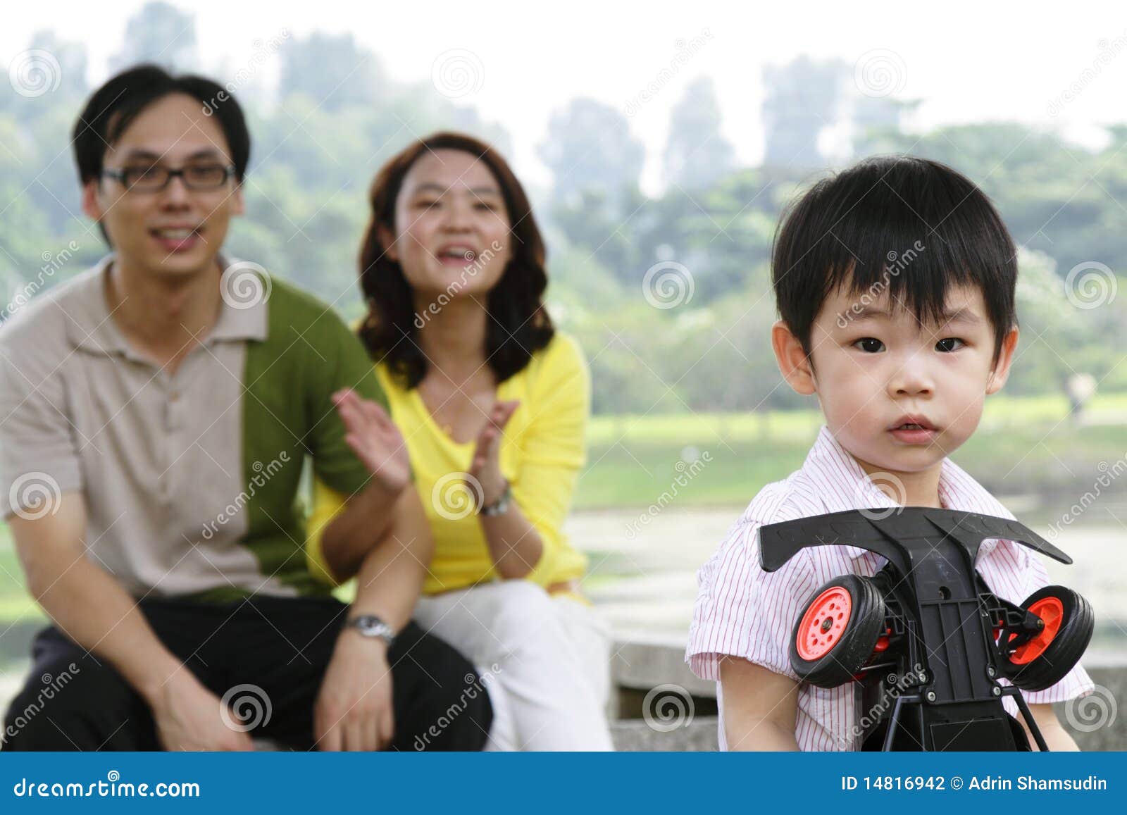 Boy with parents stock photo. Image of family, people - 14816942