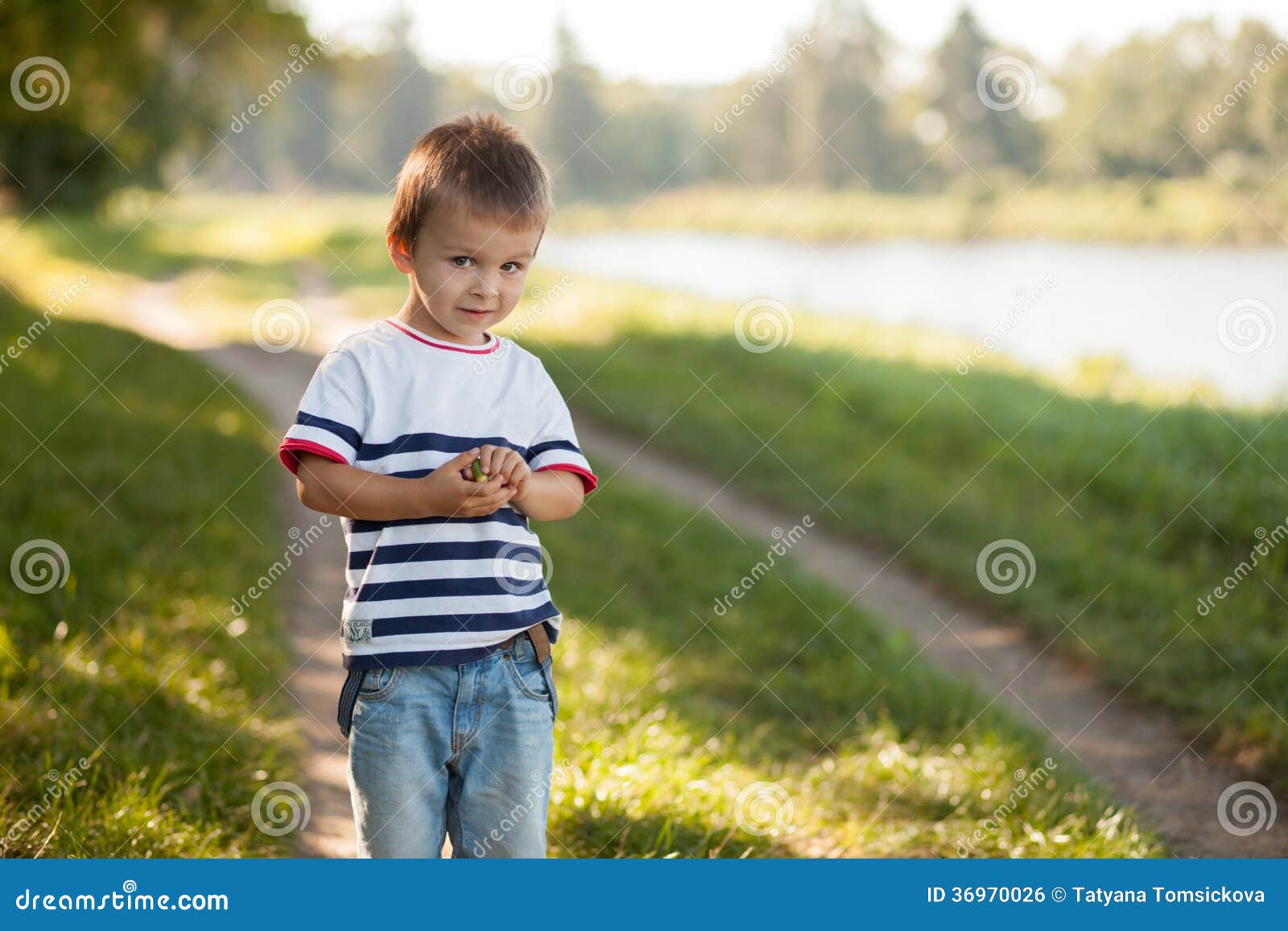 Boy in a park, posing stock photo. Image of cute, child - 36970026