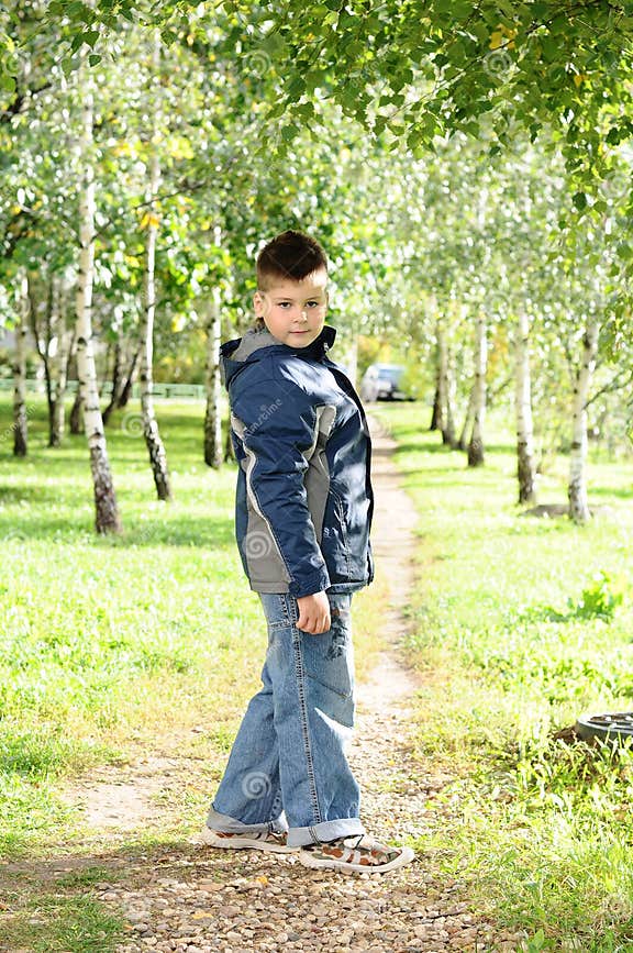 The Boy is on Path in the Park Stock Image - Image of child, jacket ...