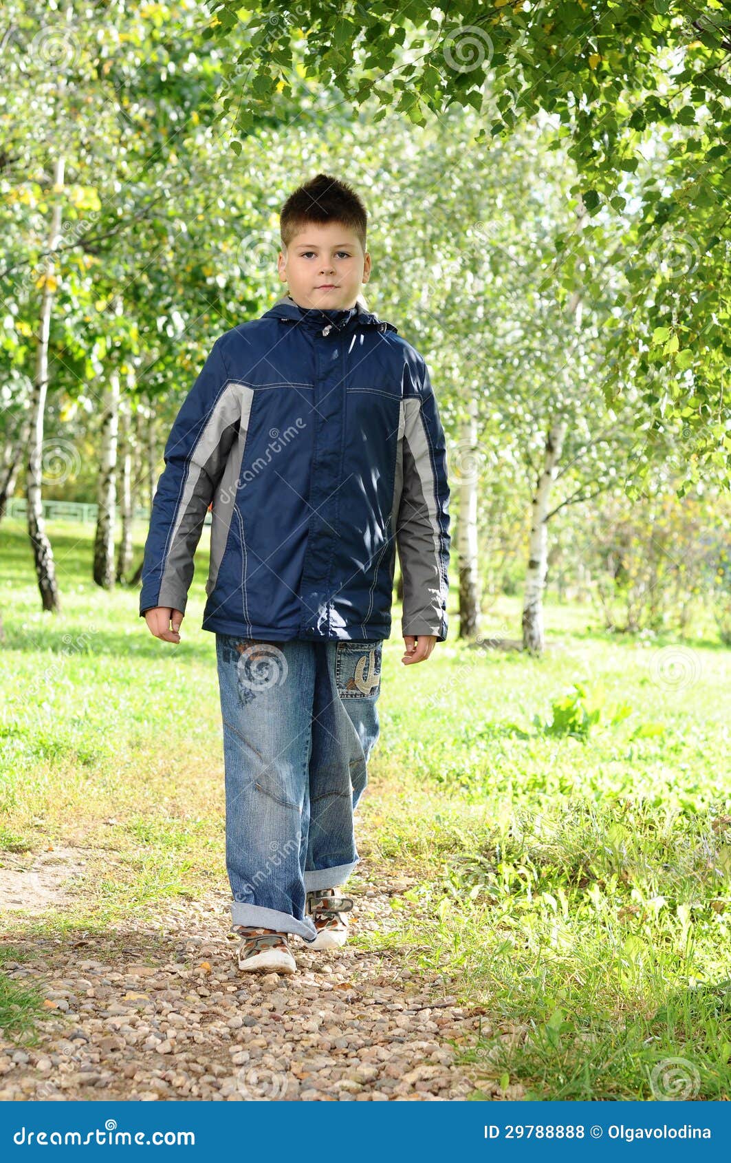 The Boy is on Path in the Park Stock Photo - Image of jeans, talking ...