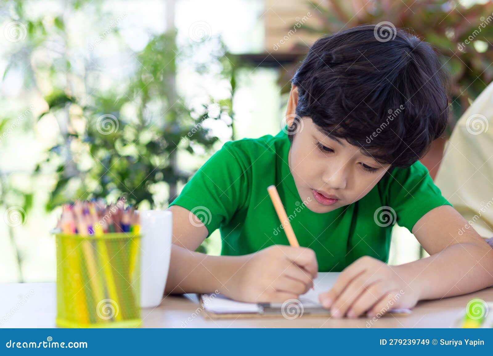 Boy with a Pencil Drawing on a Wooden Table Stock Image - Image of desk ...
