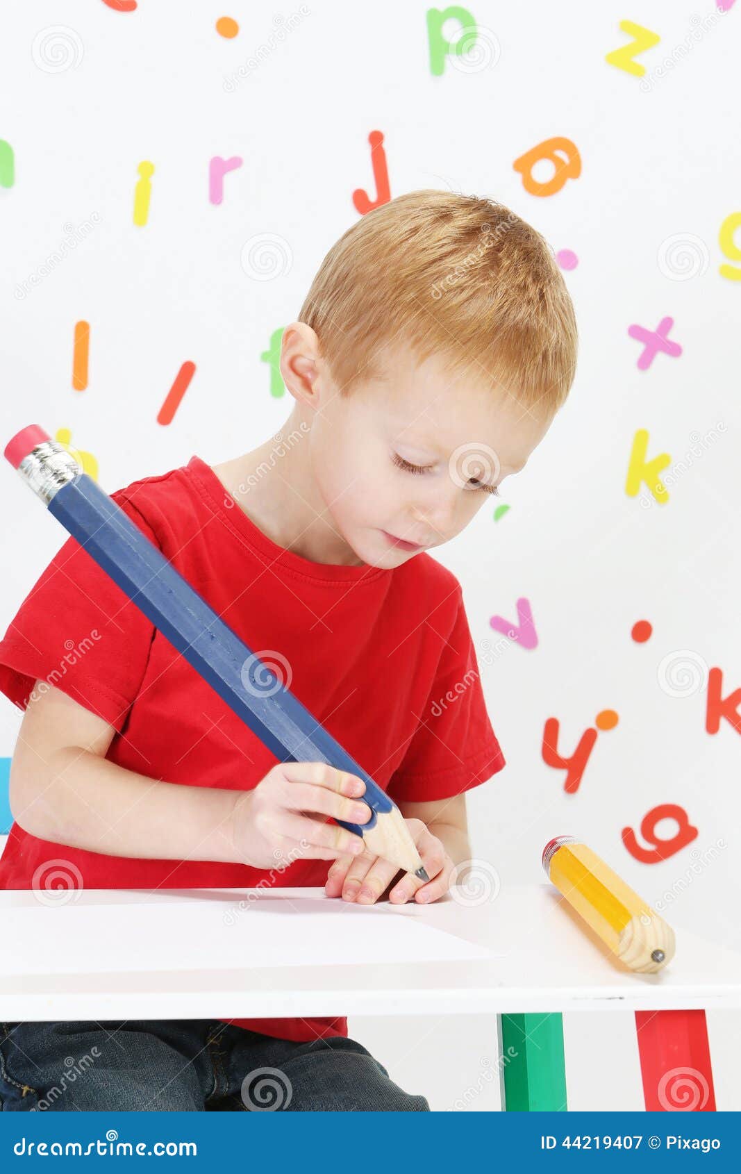 Boy and pencil stock image. Image of play, elementary - 44219407
