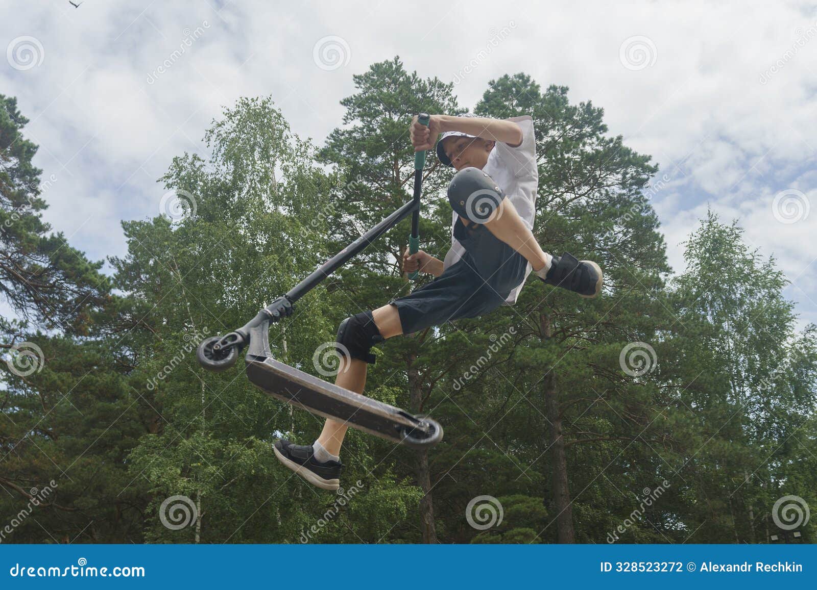 Boy Performs Extreme Stunts Jumping with a Scooter, Extreme Sports ...