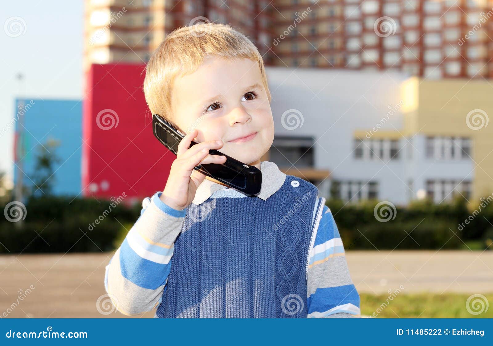 Boy with phone stock photo. Image of kids, looking, blond - 11485222