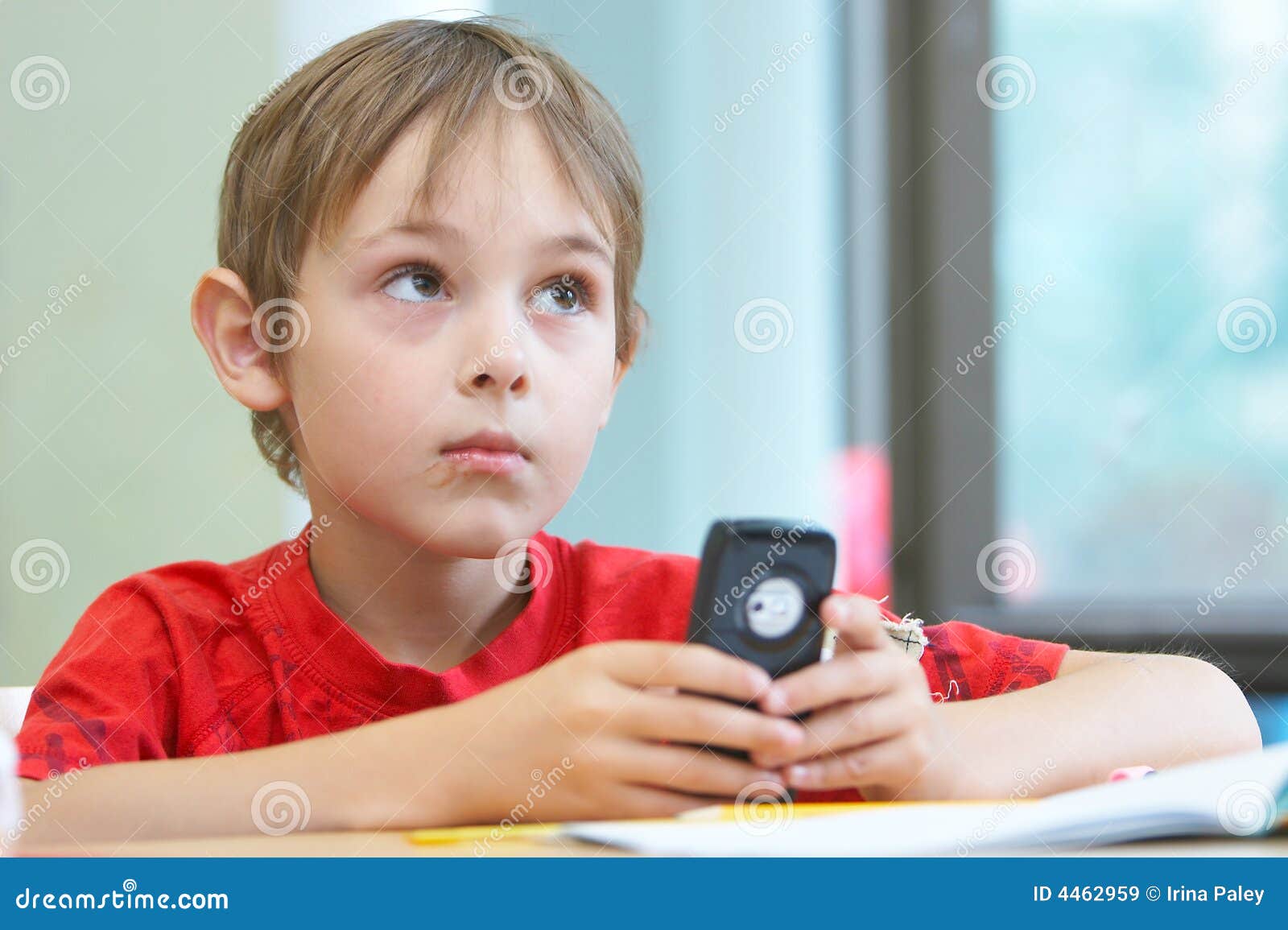 Boy with a phone stock image. Image of school, knowledge - 4462959