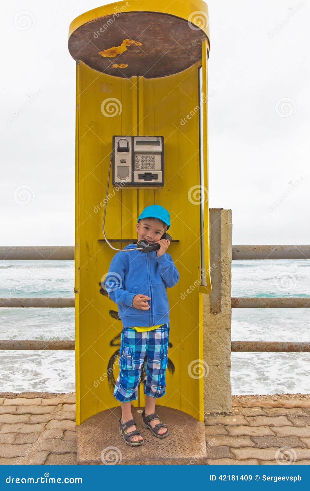 Boy in a phone booth stock image. Image of evening, little - 42181409