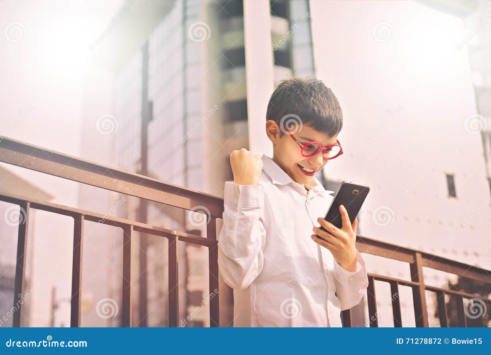 Boy with phone stock photo. Image of atmosphere, grow - 71278872