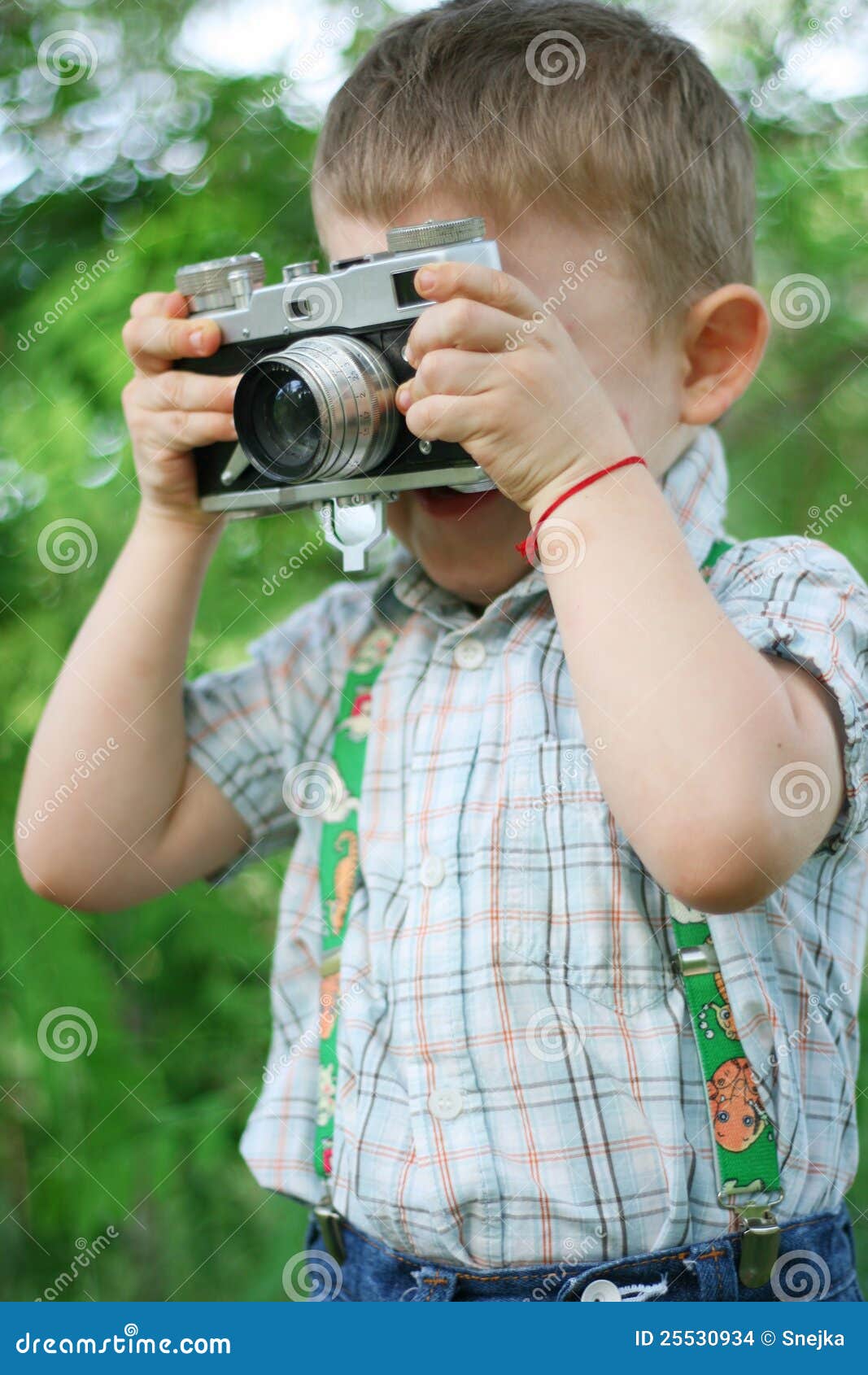 Boy photographer stock photo. Image of park, small, camera - 25530934