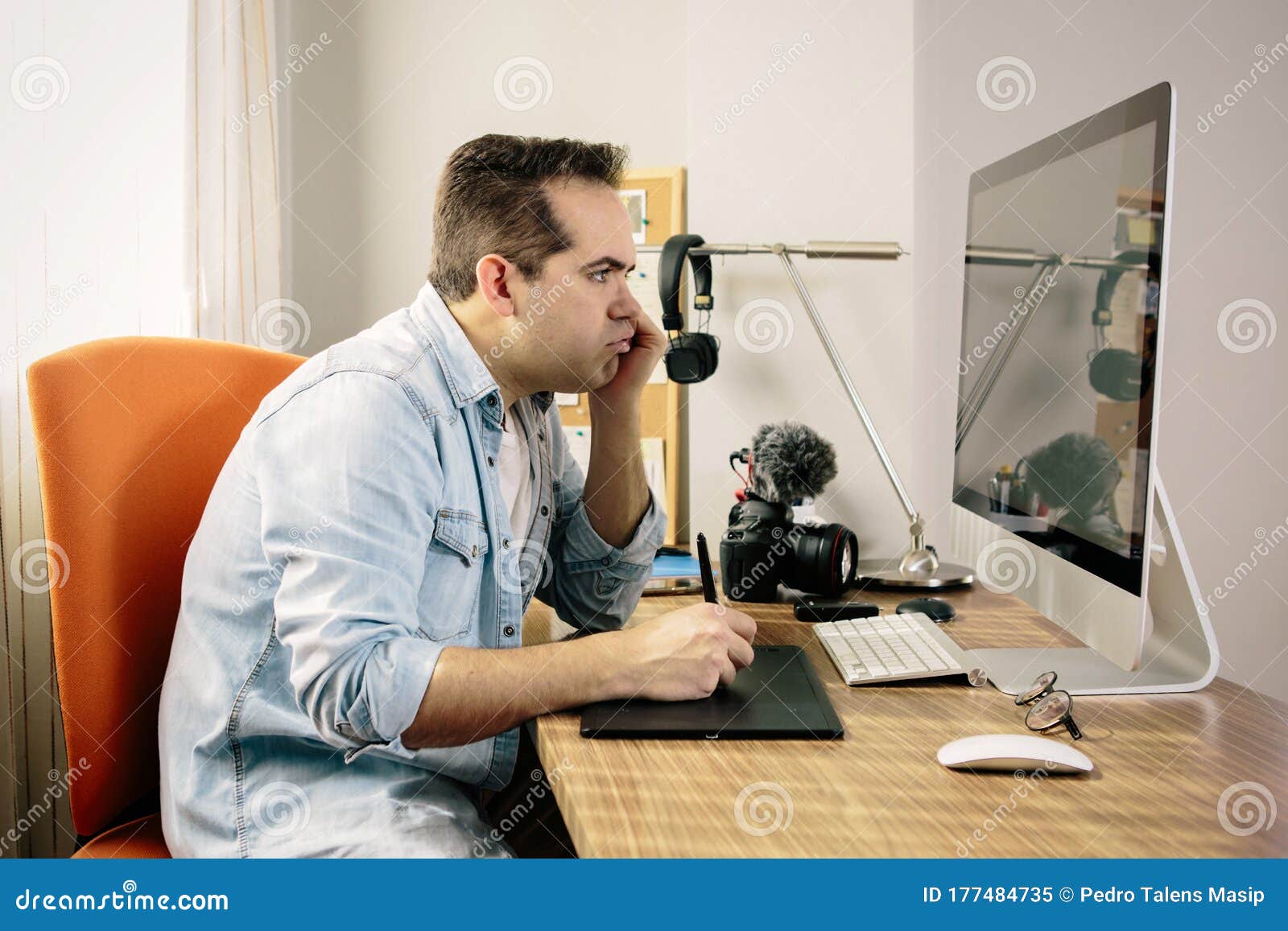 Boy Photographer Tired of Working from Home with His Computer. on the ...