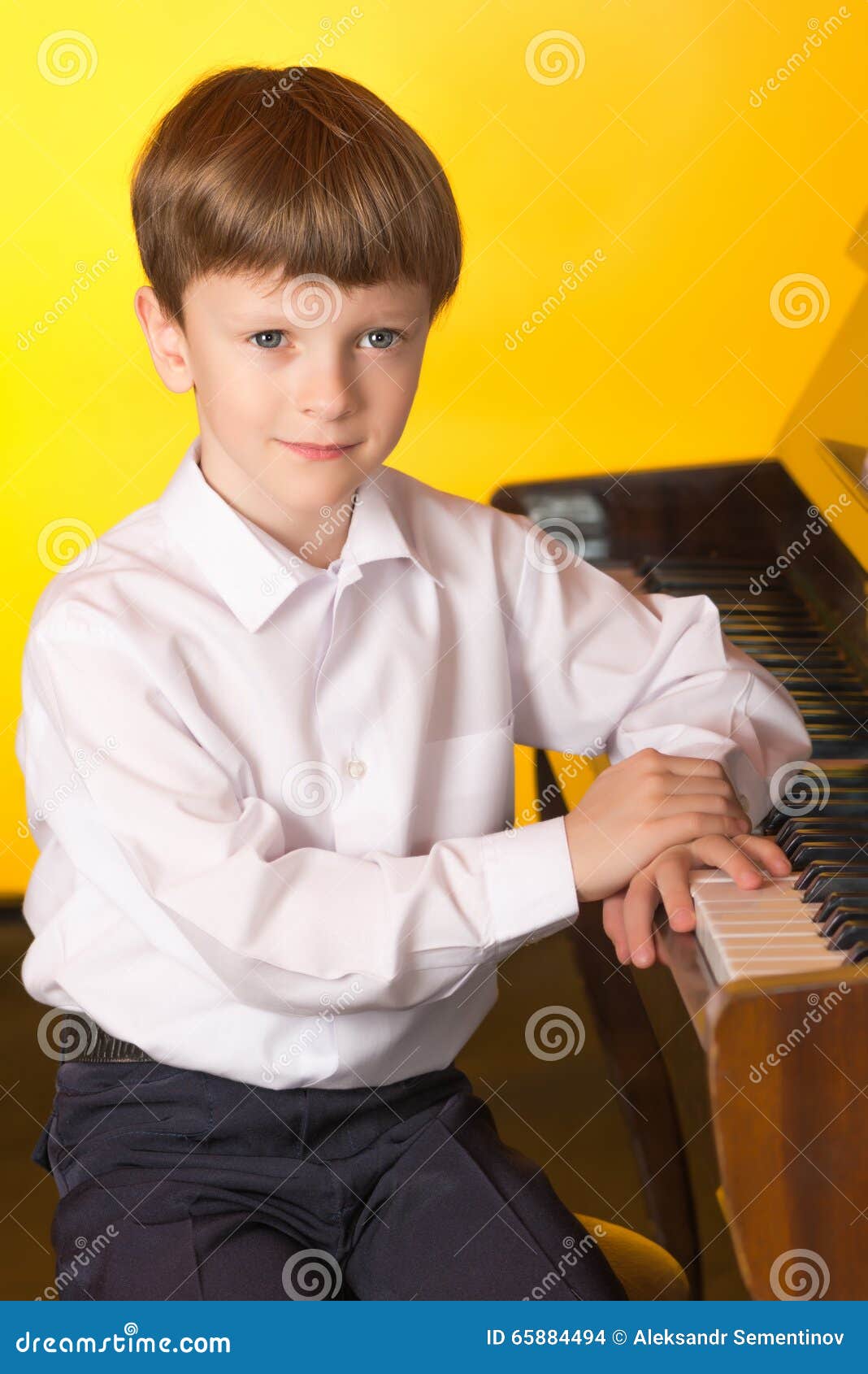 Boy piano. Piano player. stock photo. Image of development - 65884494