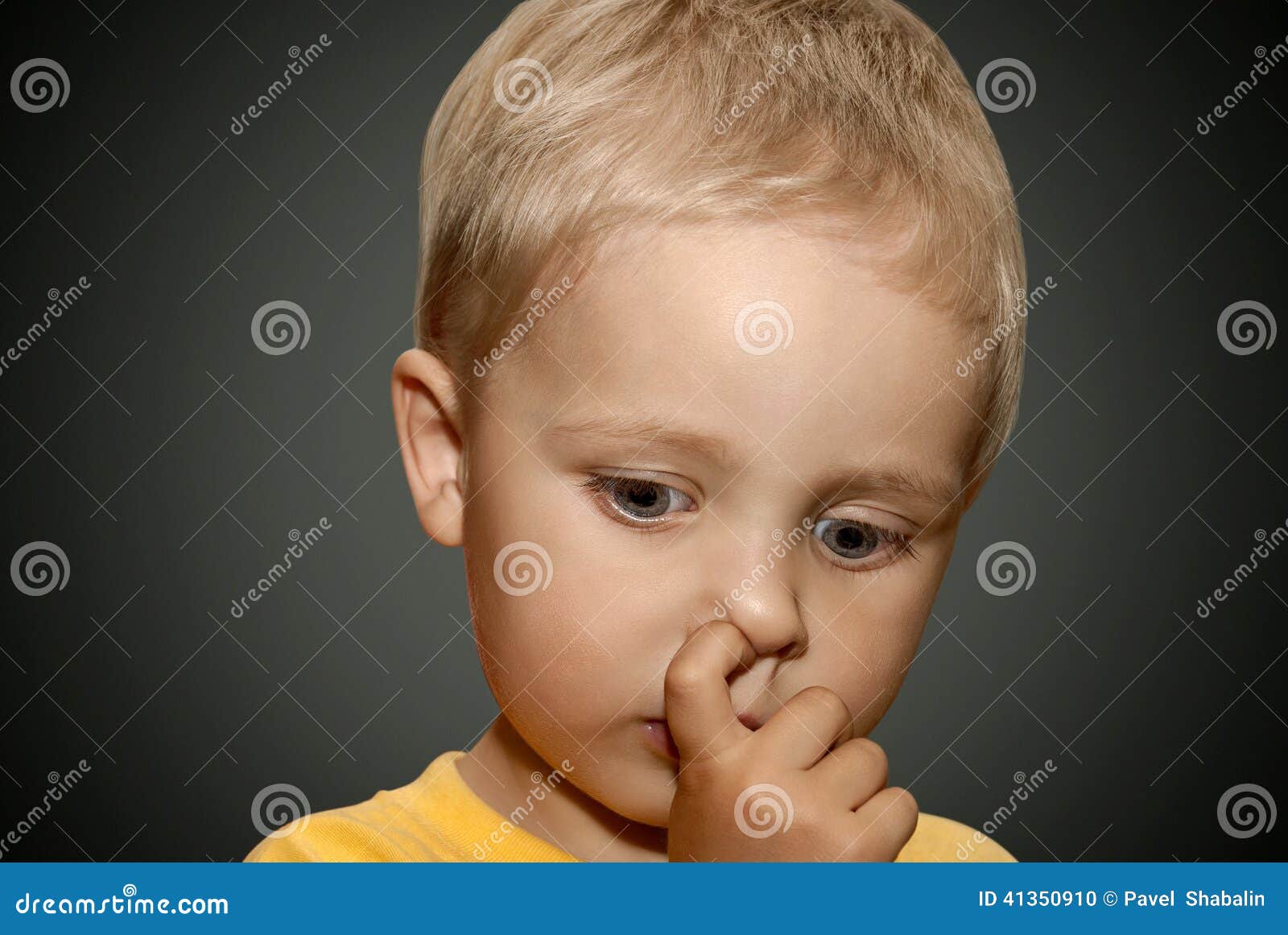 Boy picking his nose. stock photo. Image of look, occupation - 41350910