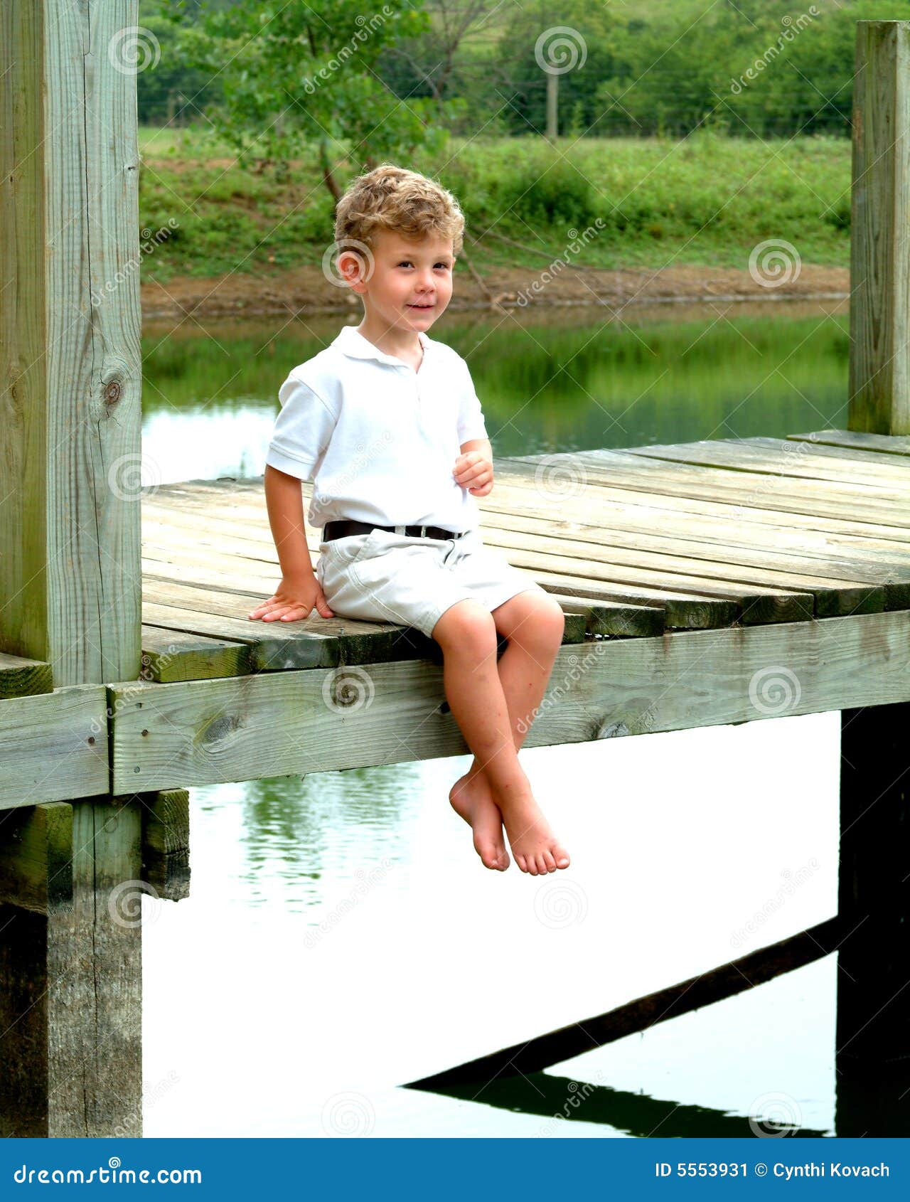 Boy on Pier stock image. Image of smiling, outdoor, outside - 5553931