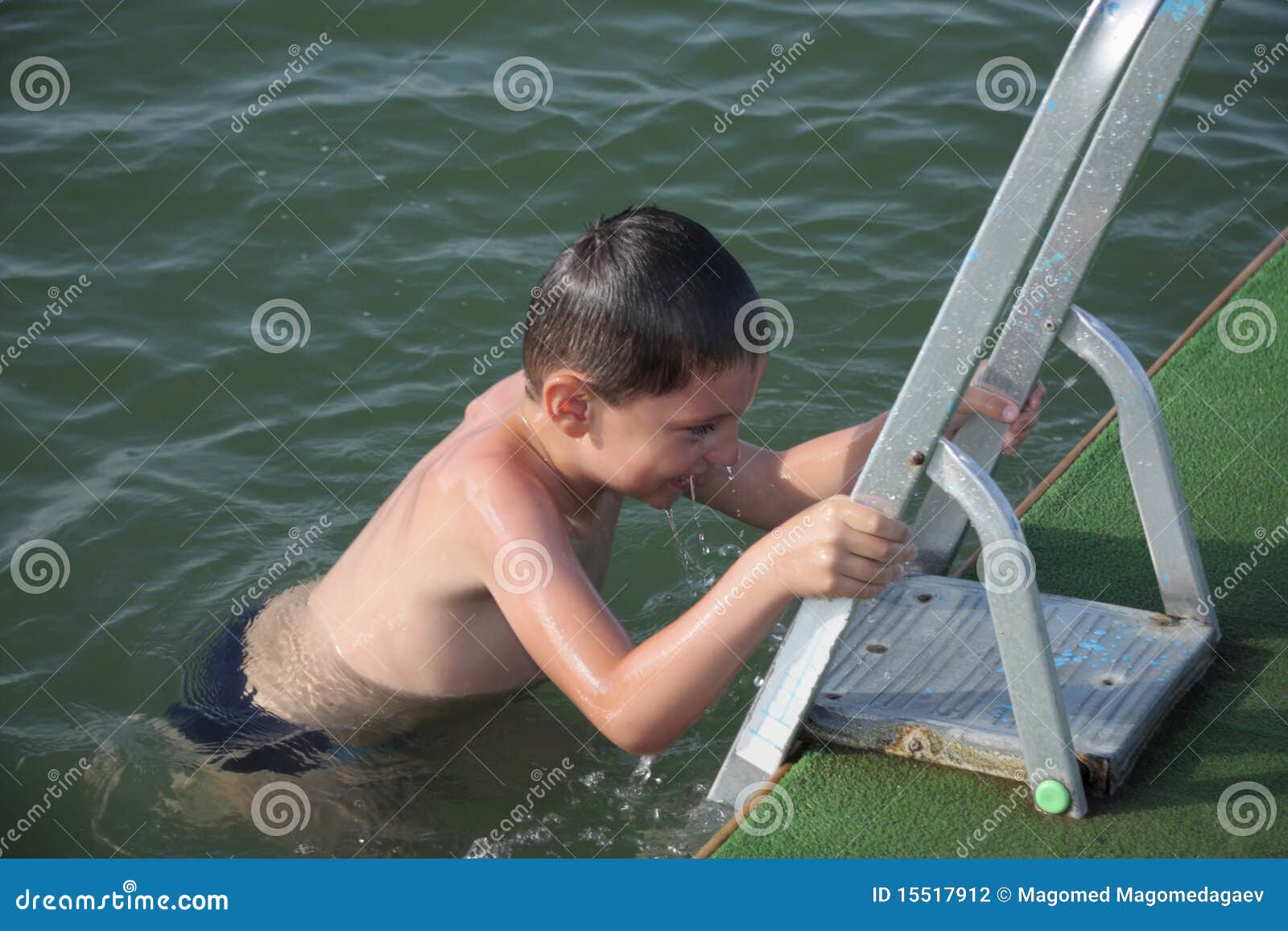 Boy at pier ladder stock photo. Image of child, horizontal - 15517912