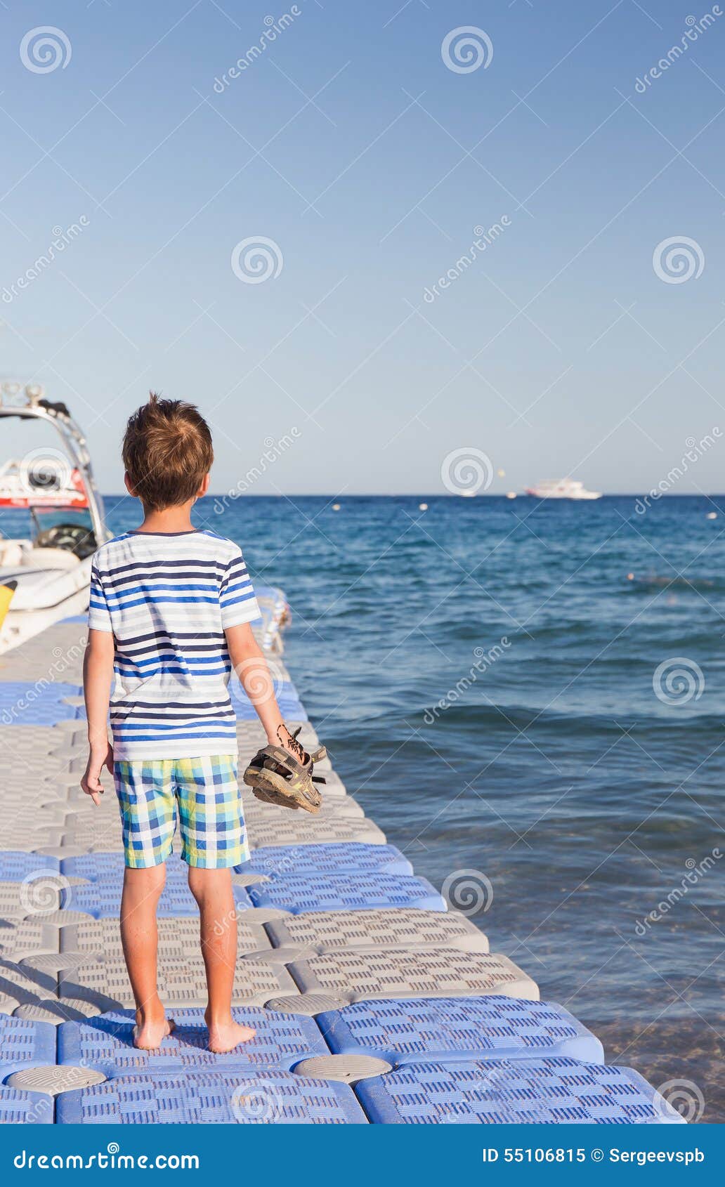 Boy on the pier stock image. Image of holiday, caucasian - 55106815
