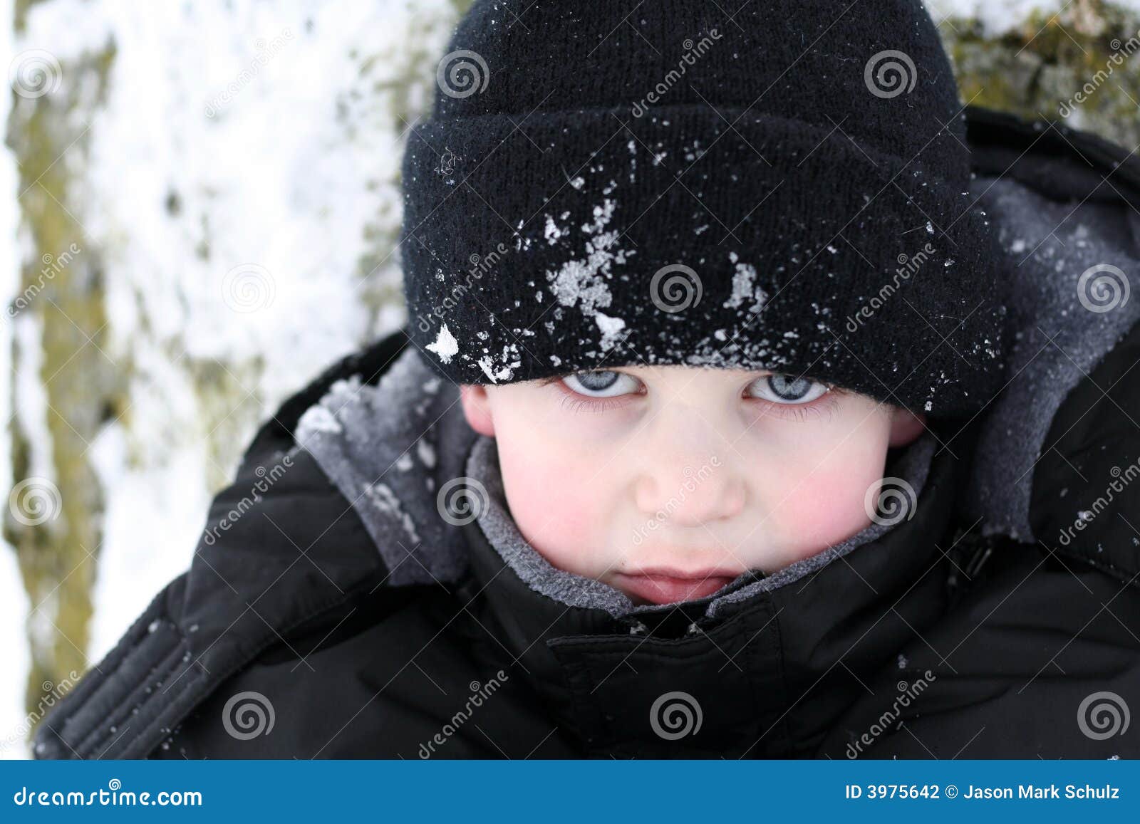 Boy piercing look in snow stock photo. Image of blue, knit - 3975642