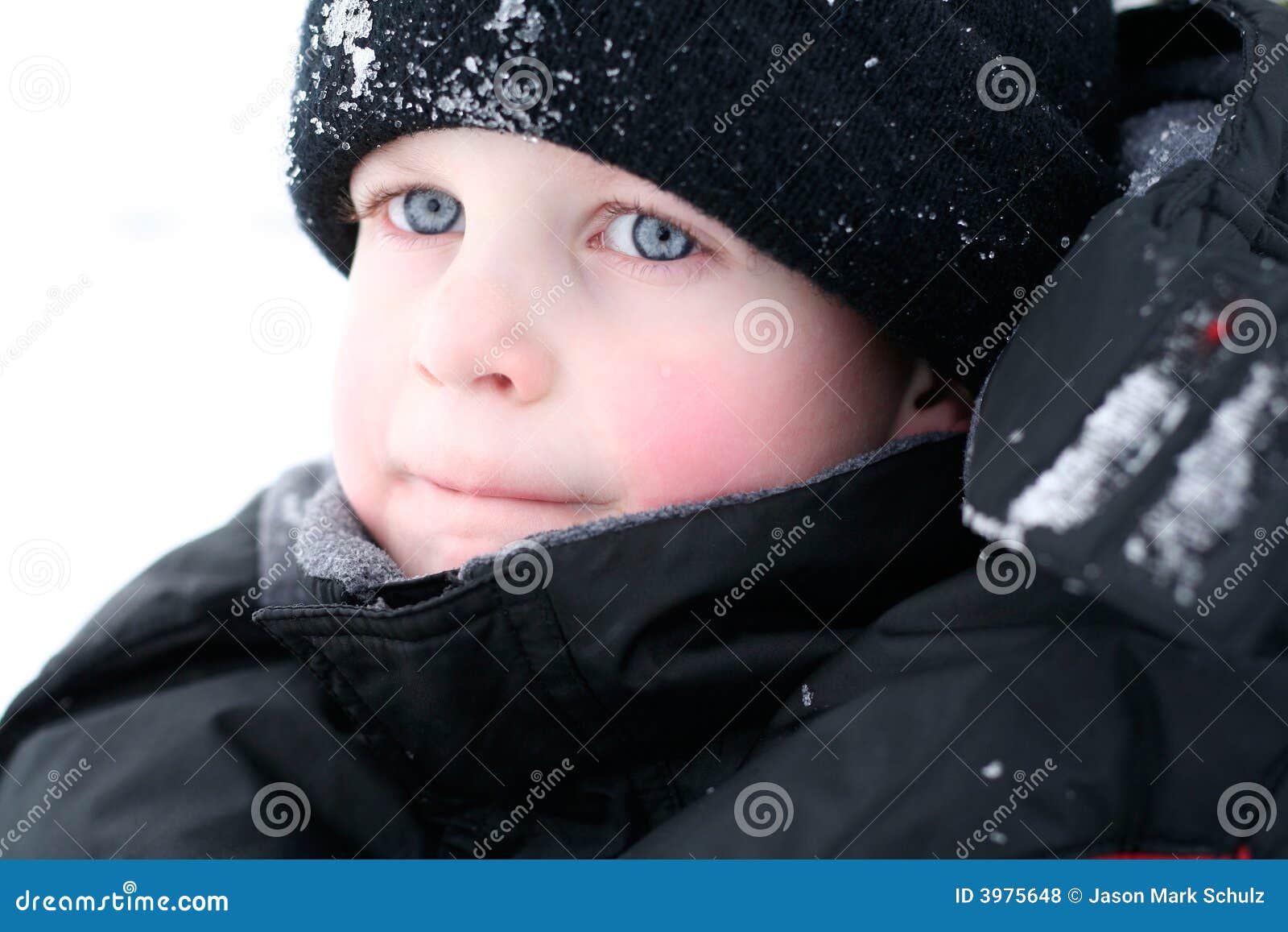 Boy piercing look in snow stock photo. Image of white - 3975648