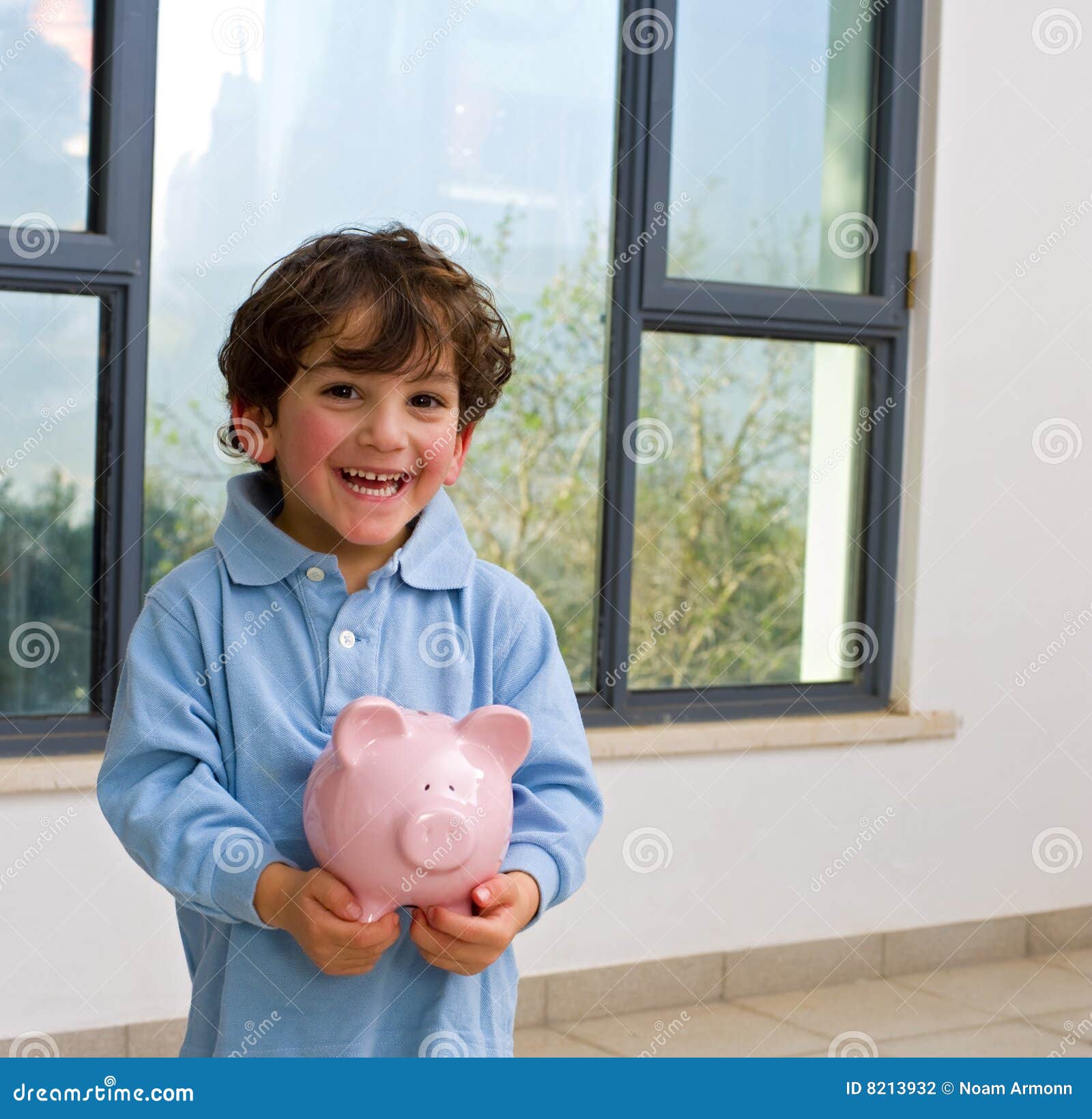 Boy piggy bank stock photo. Image of investment, caucasian - 8213932
