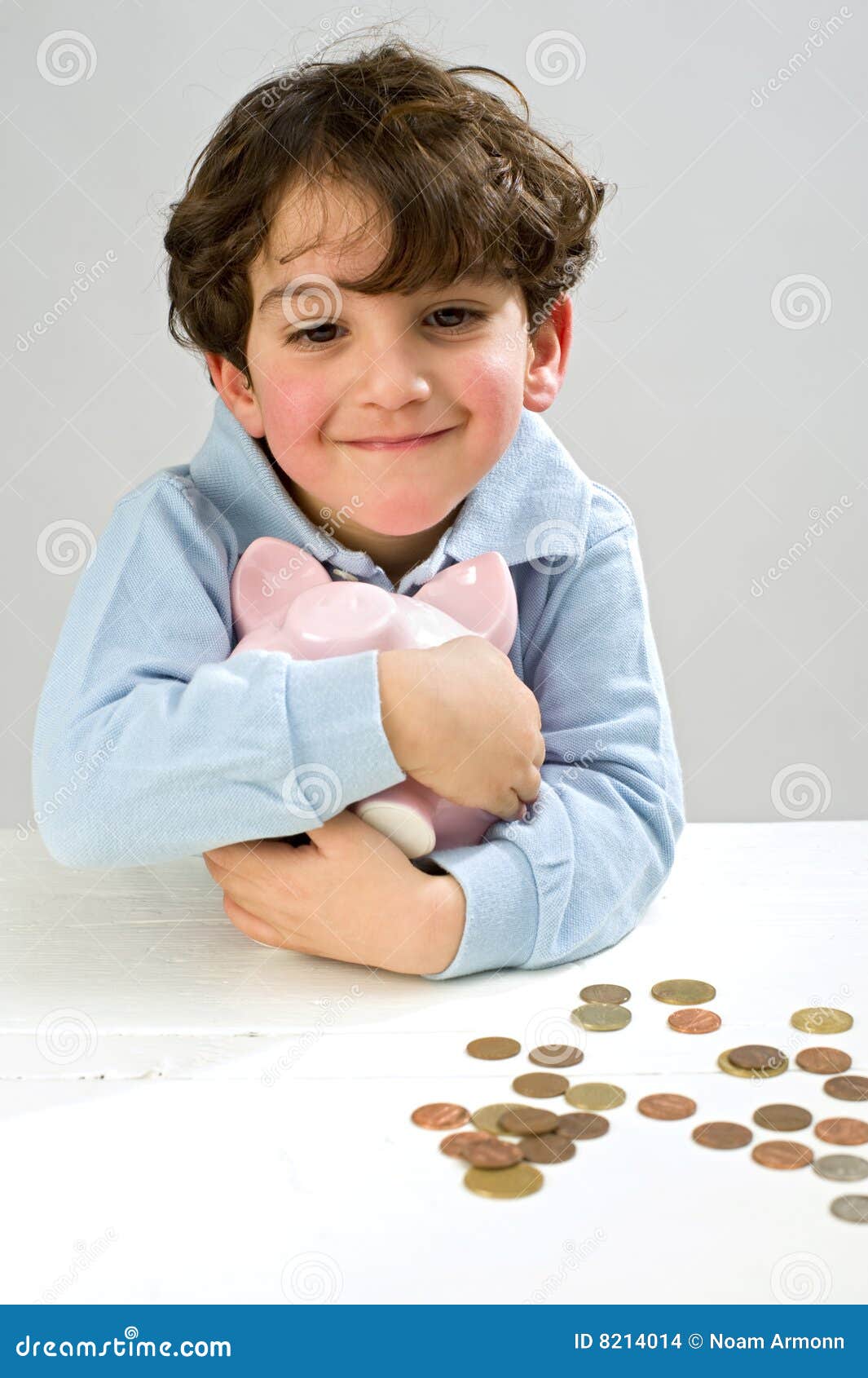 Boy piggy bank stock photo. Image of child, expression - 8214014