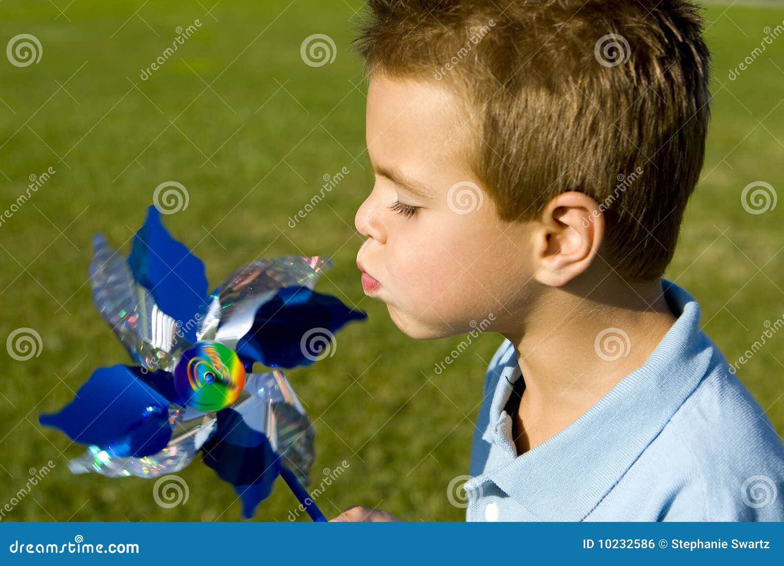 Boy pinwheel stock photo. Image of outside, handsome - 10232586