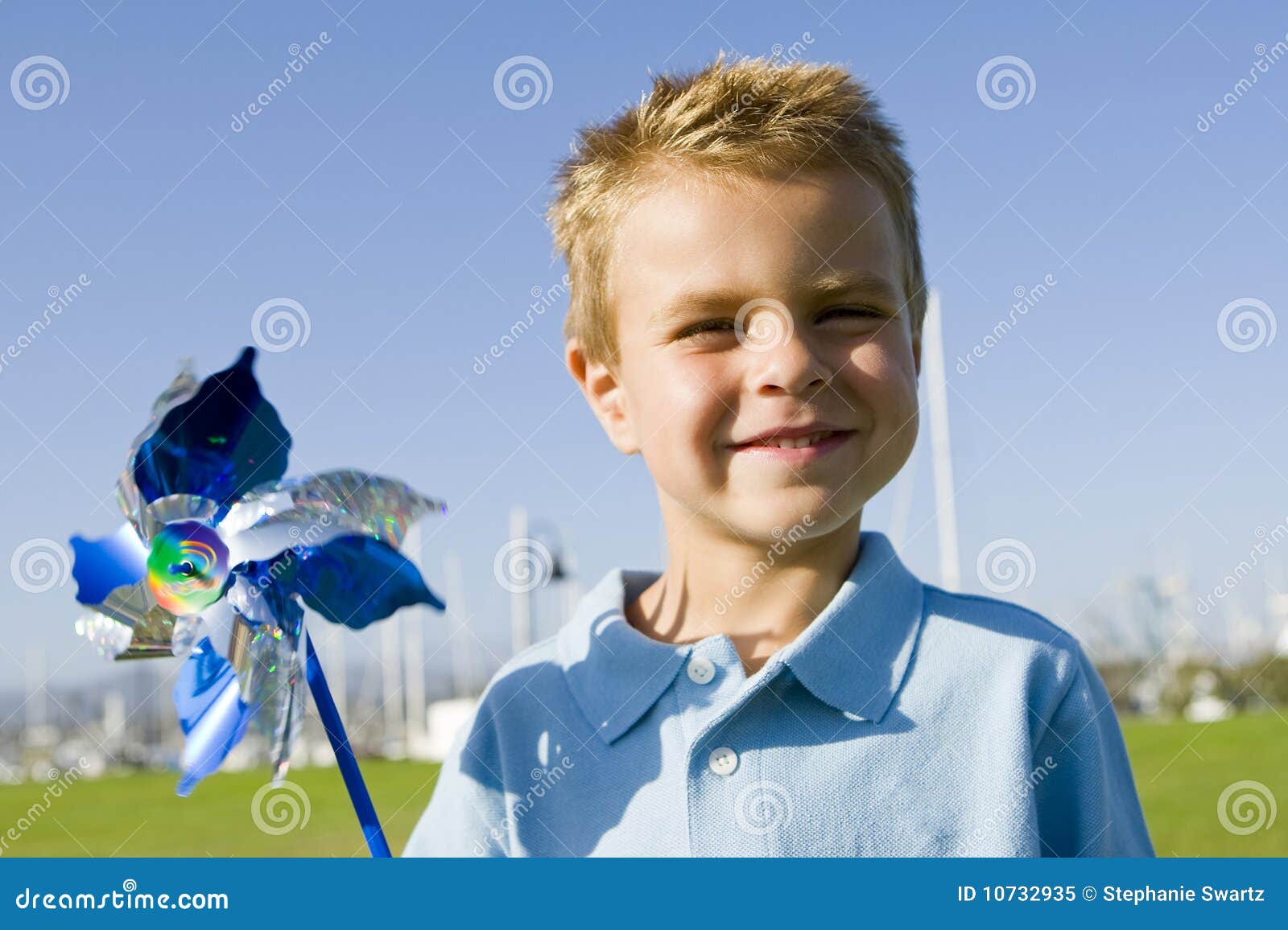 Boy pinwheel stock image. Image of childhood, play, happiness - 10732935