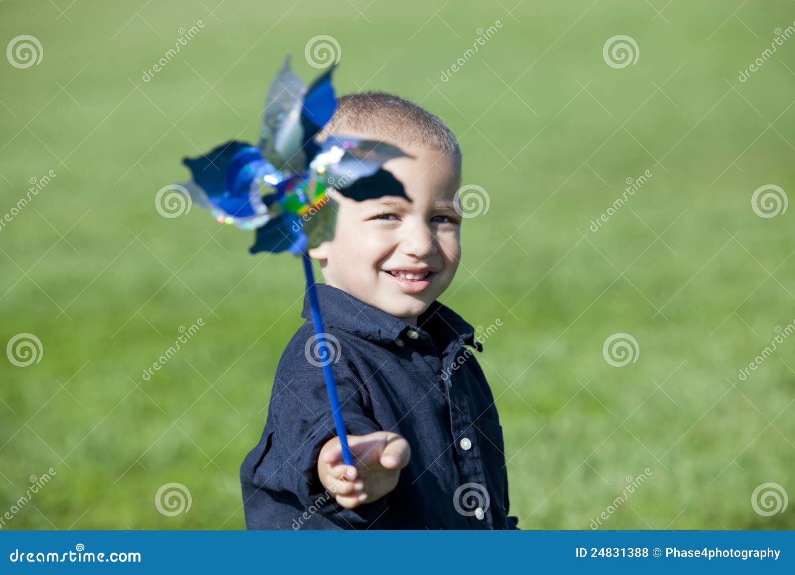 Boy pinwheel stock photo. Image of handsome, happy, american - 24831388
