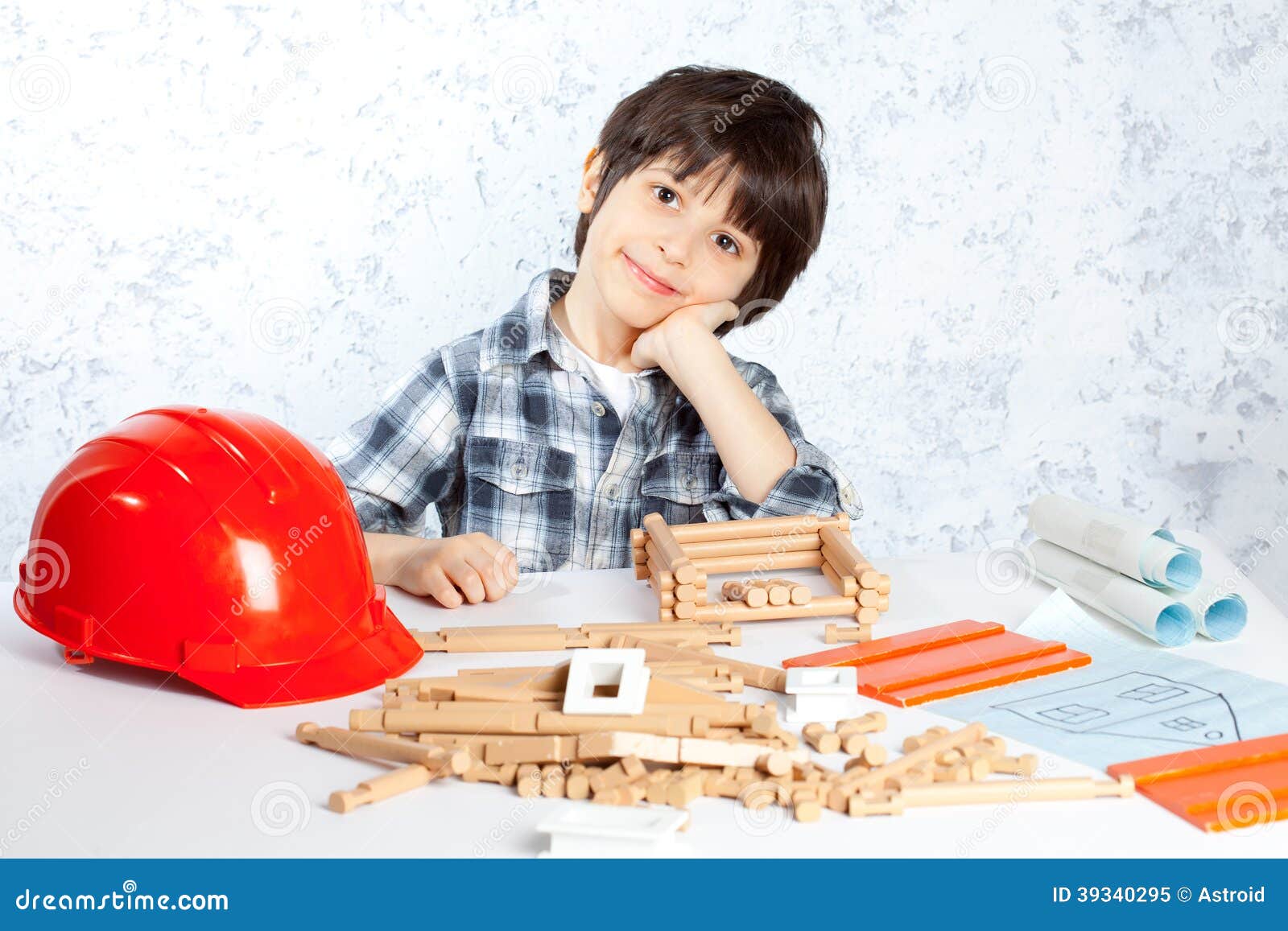 Boy plans to build a house stock image. Image of happiness - 39340295