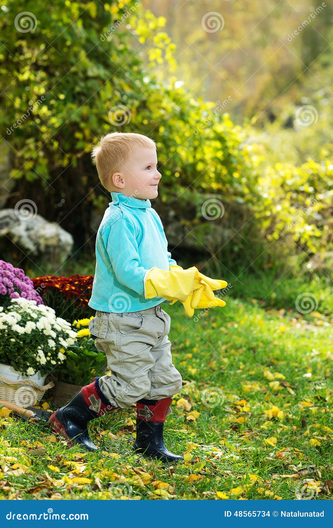 Boy planting flowers stock photo. Image of environment - 48565734