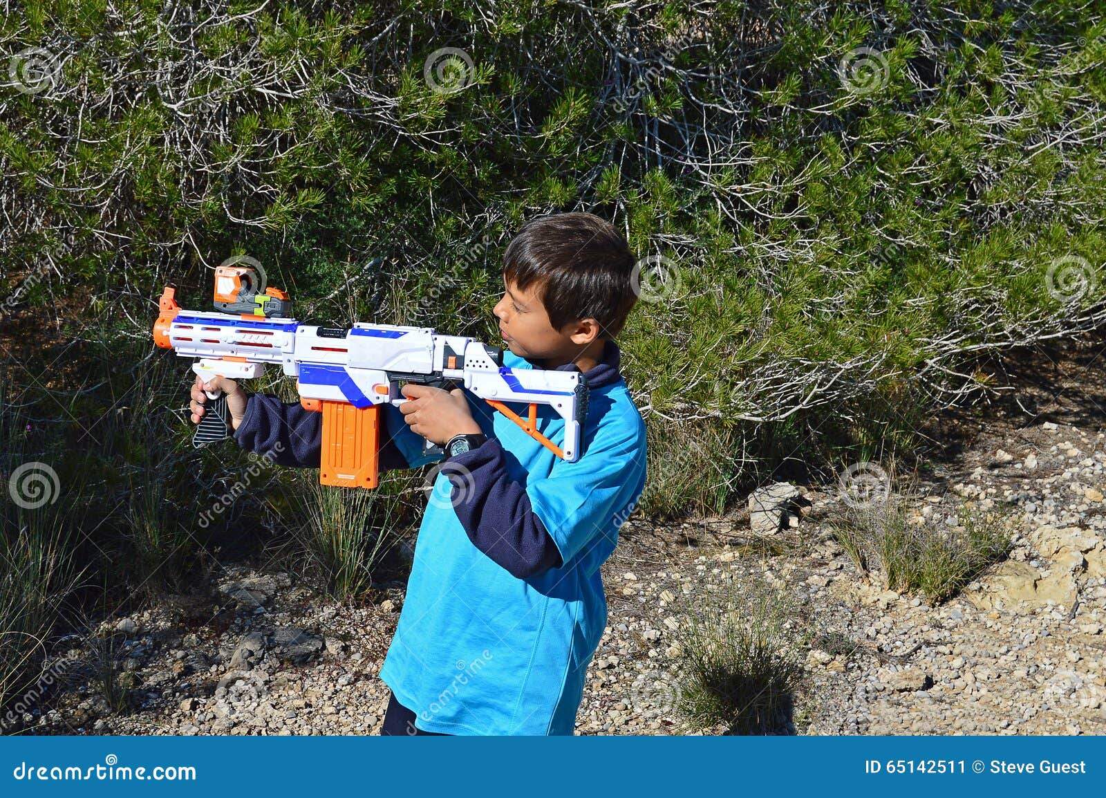 Nerf Gun stock image. Image of weapon, holding, paintballing - 65142511