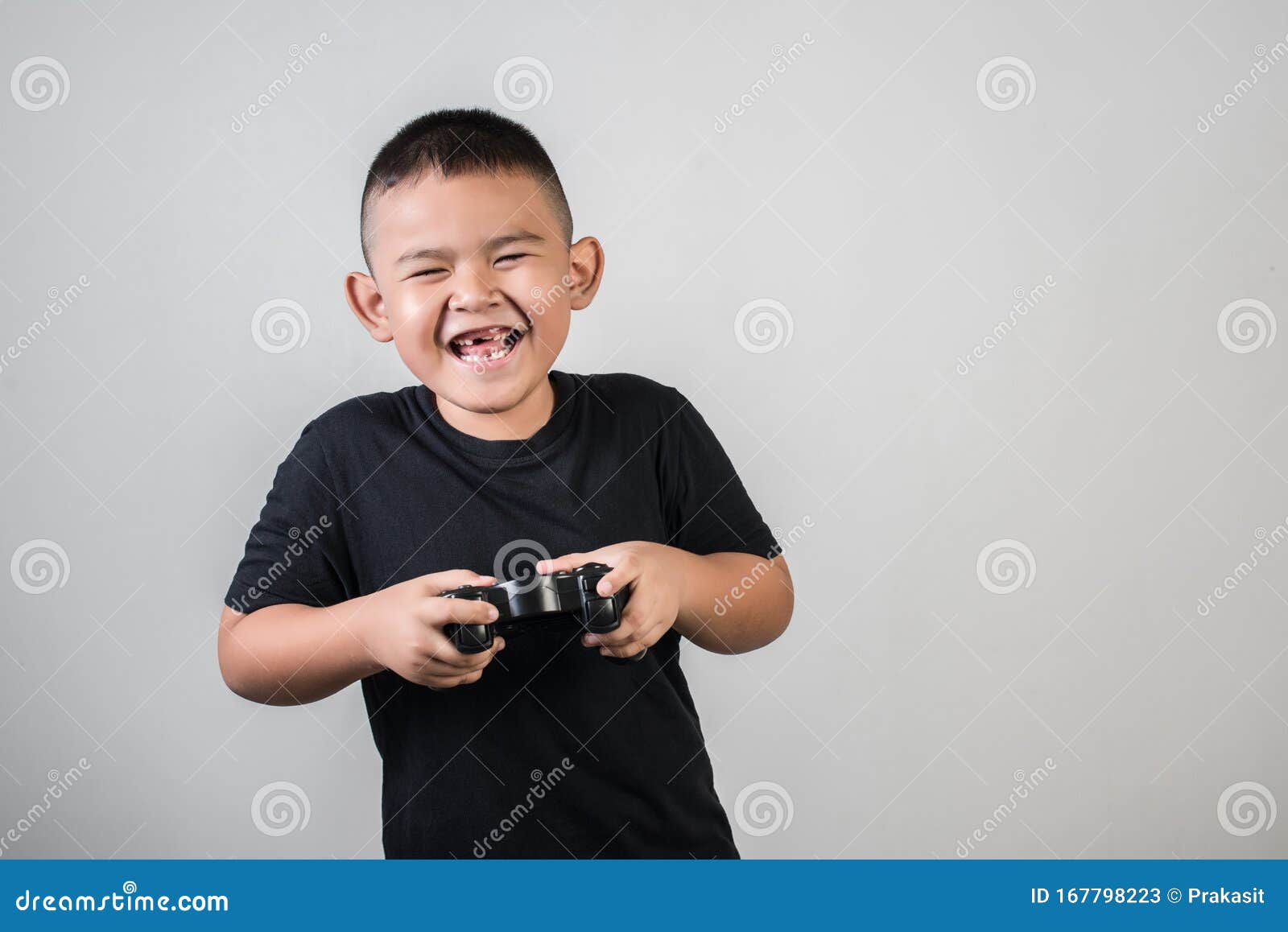 Boy Play Game Computer with a Controller in Studio Photo Stock Image ...