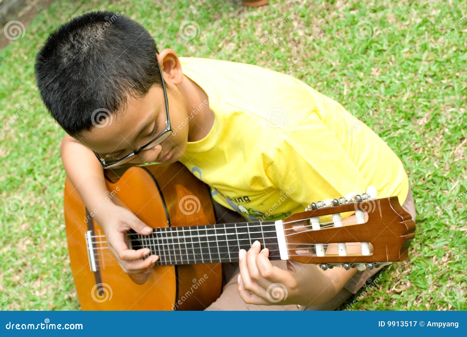 Boy play guitar stock image. Image of guitar, learn, song - 9913517