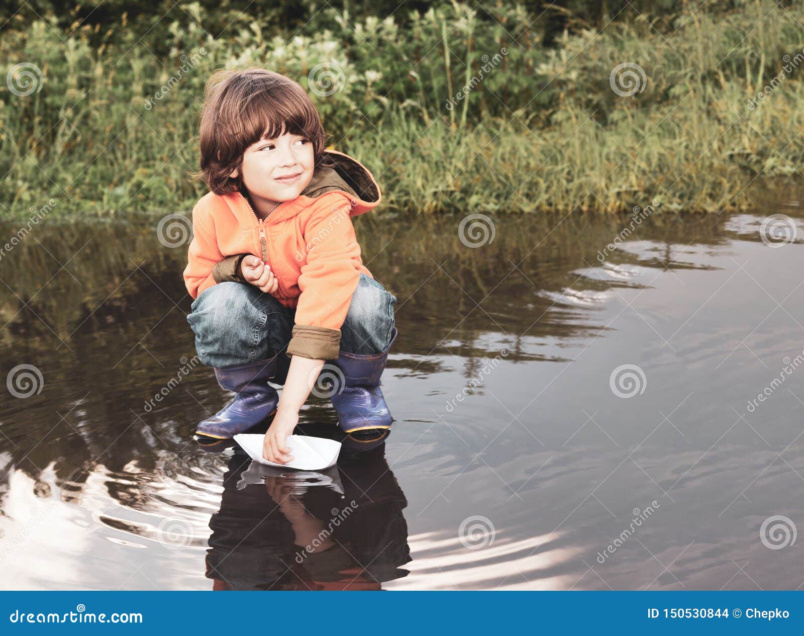Boy play in puddle stock photo. Image of babies, leisure - 150530844