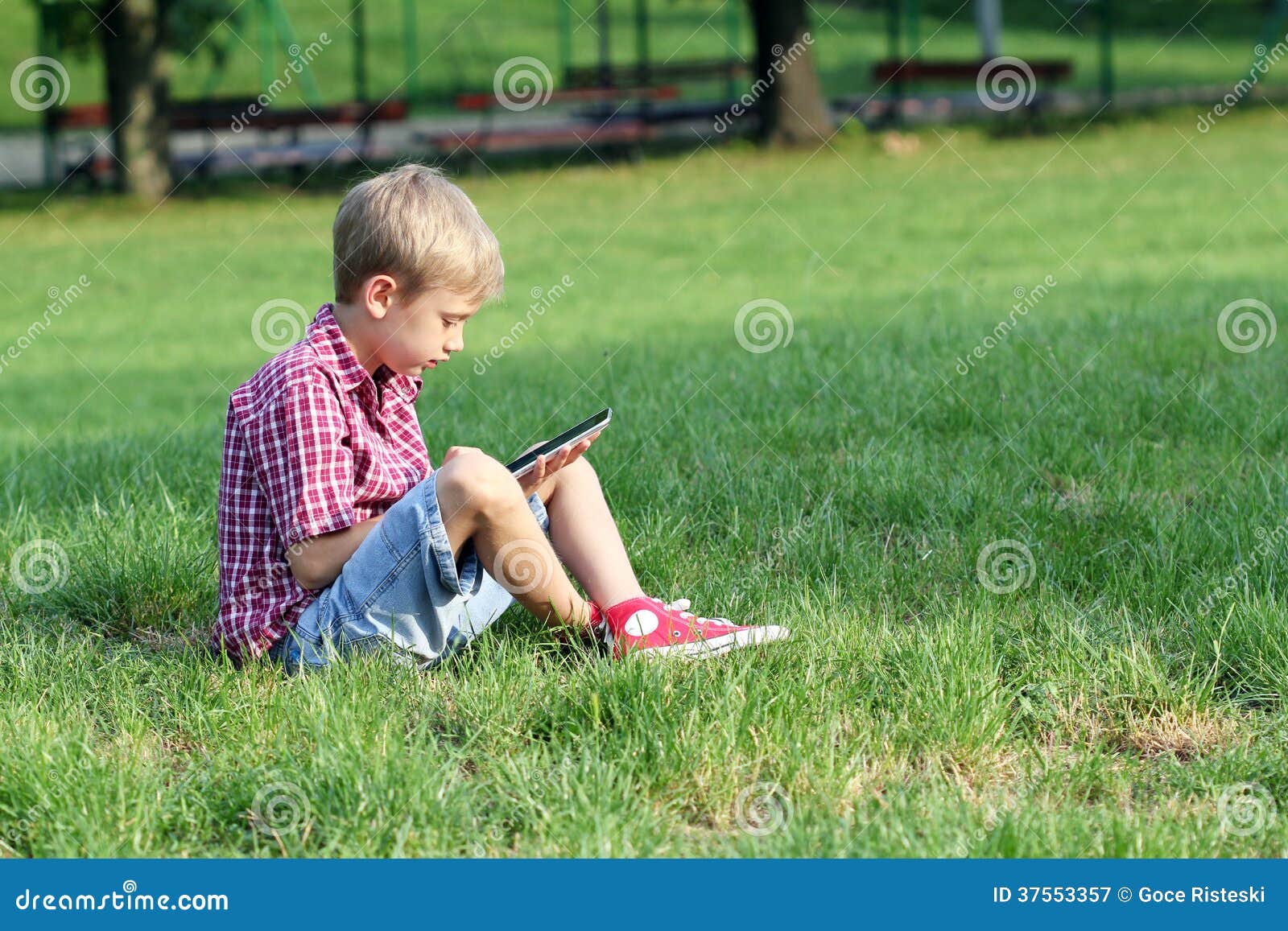 Boy play with tablet pc stock image. Image of communication - 37553357