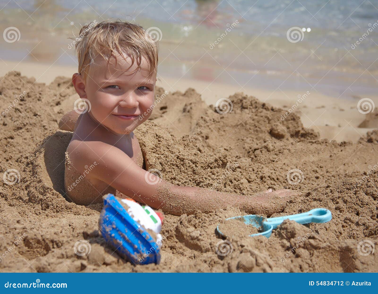 Boy play on th beach stock photo. Image of caucasian - 54834712