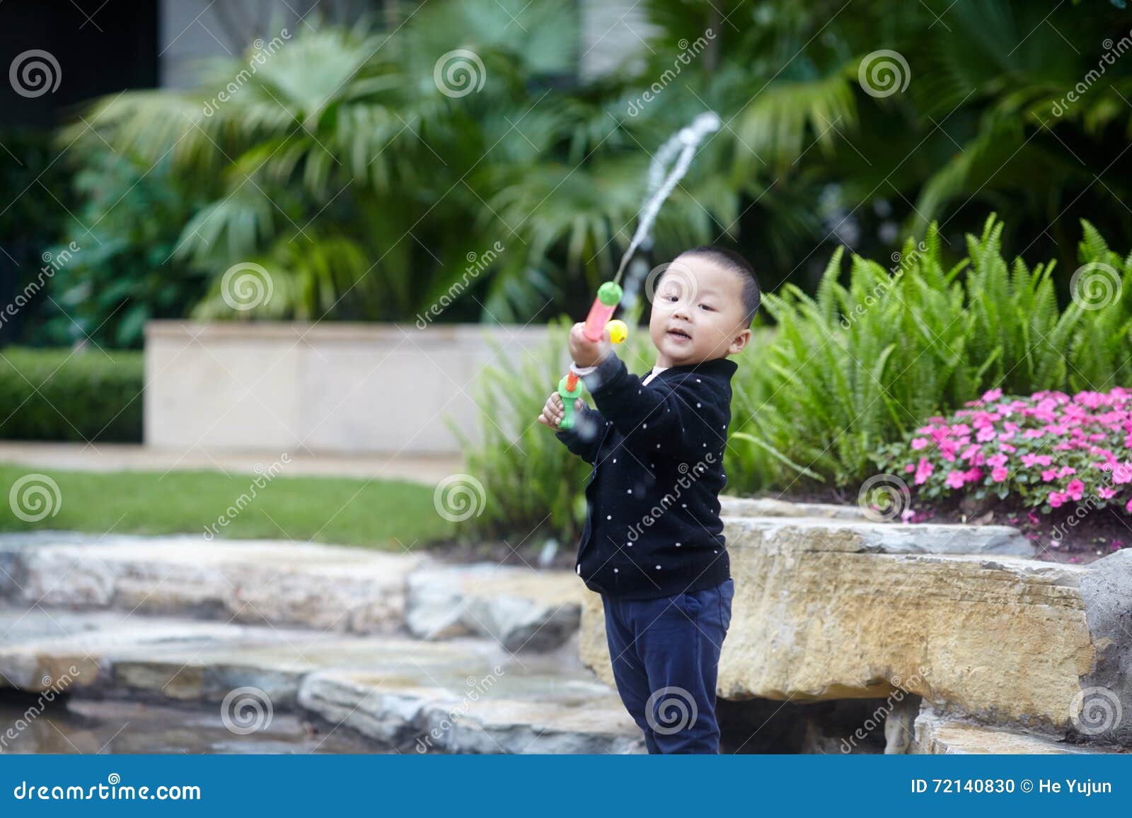 Boy play water gun stock photo. Image of water, active - 72140830