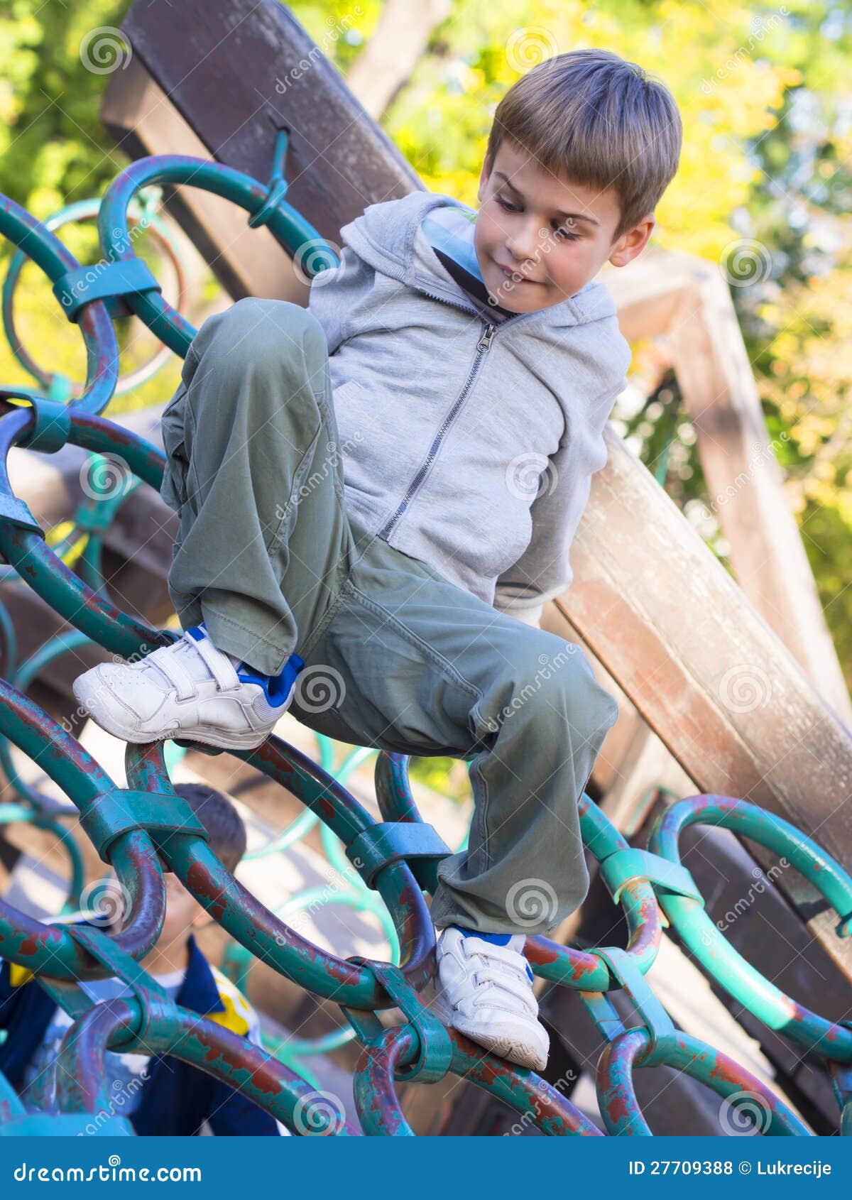 Boy at the playground stock photo. Image of exercise - 27709388