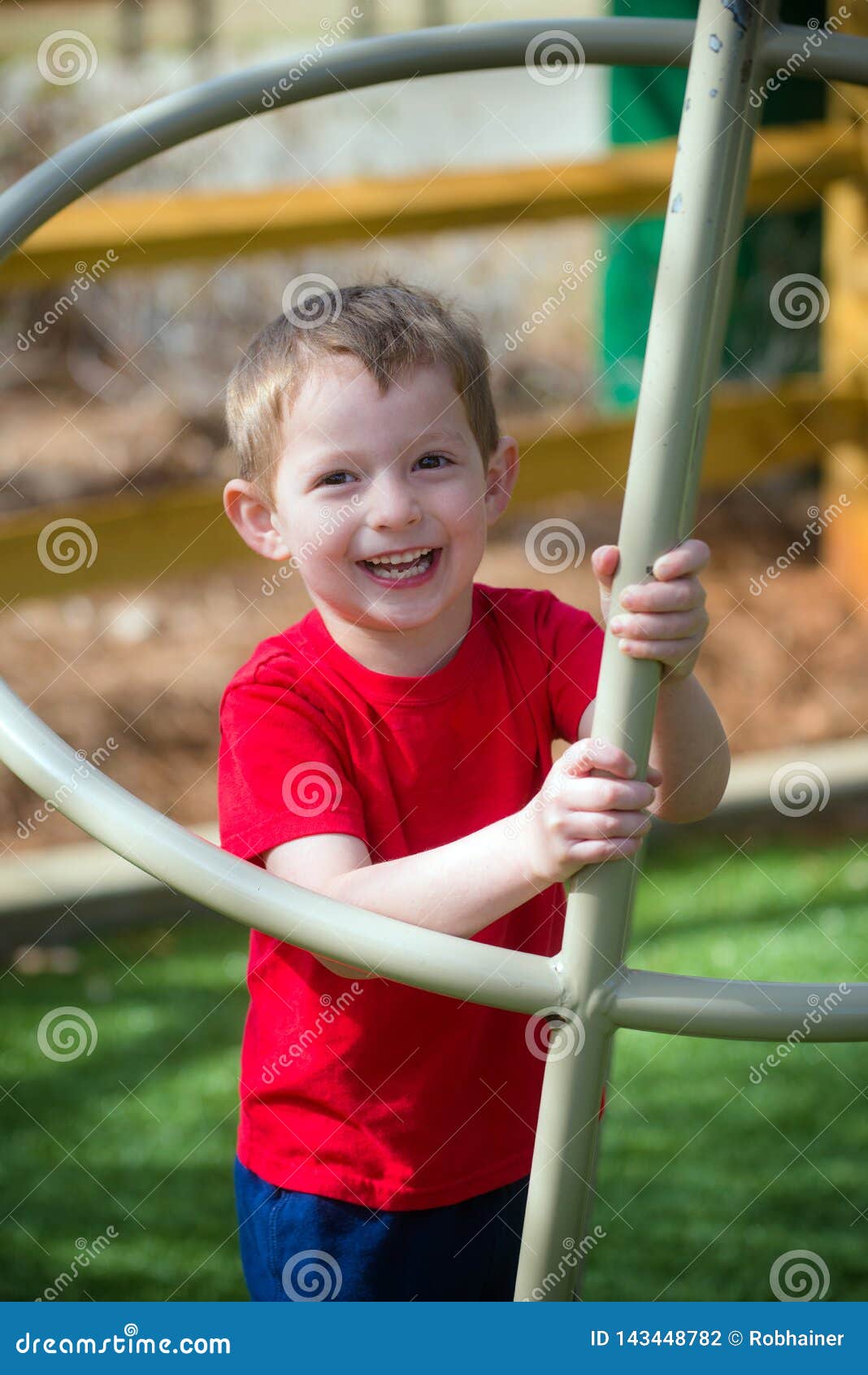 Boy on playground stock photo. Image of happiness, active - 143448782